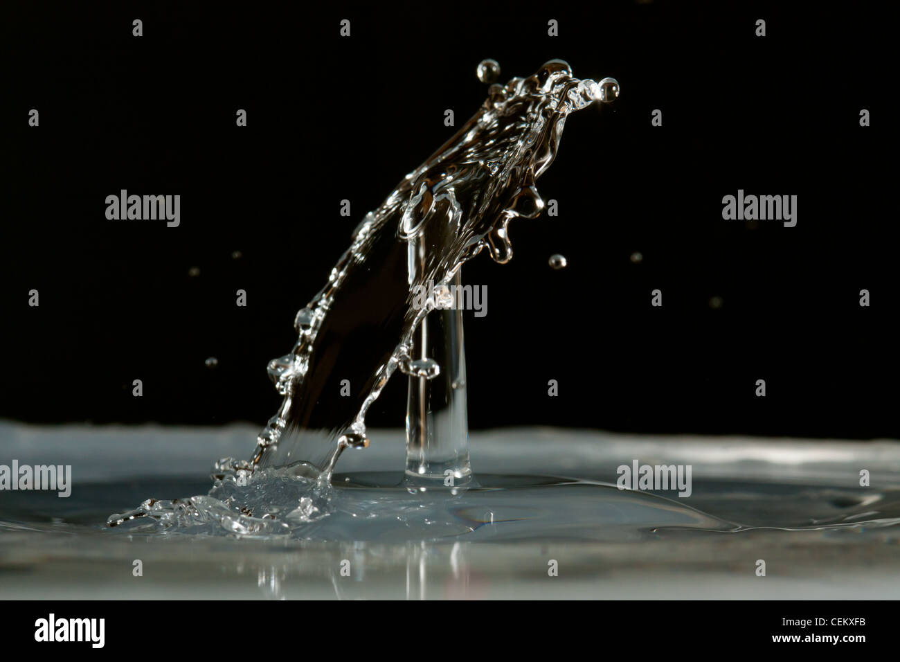 Water drop falling and colliding with another one Stock Photo - Alamy