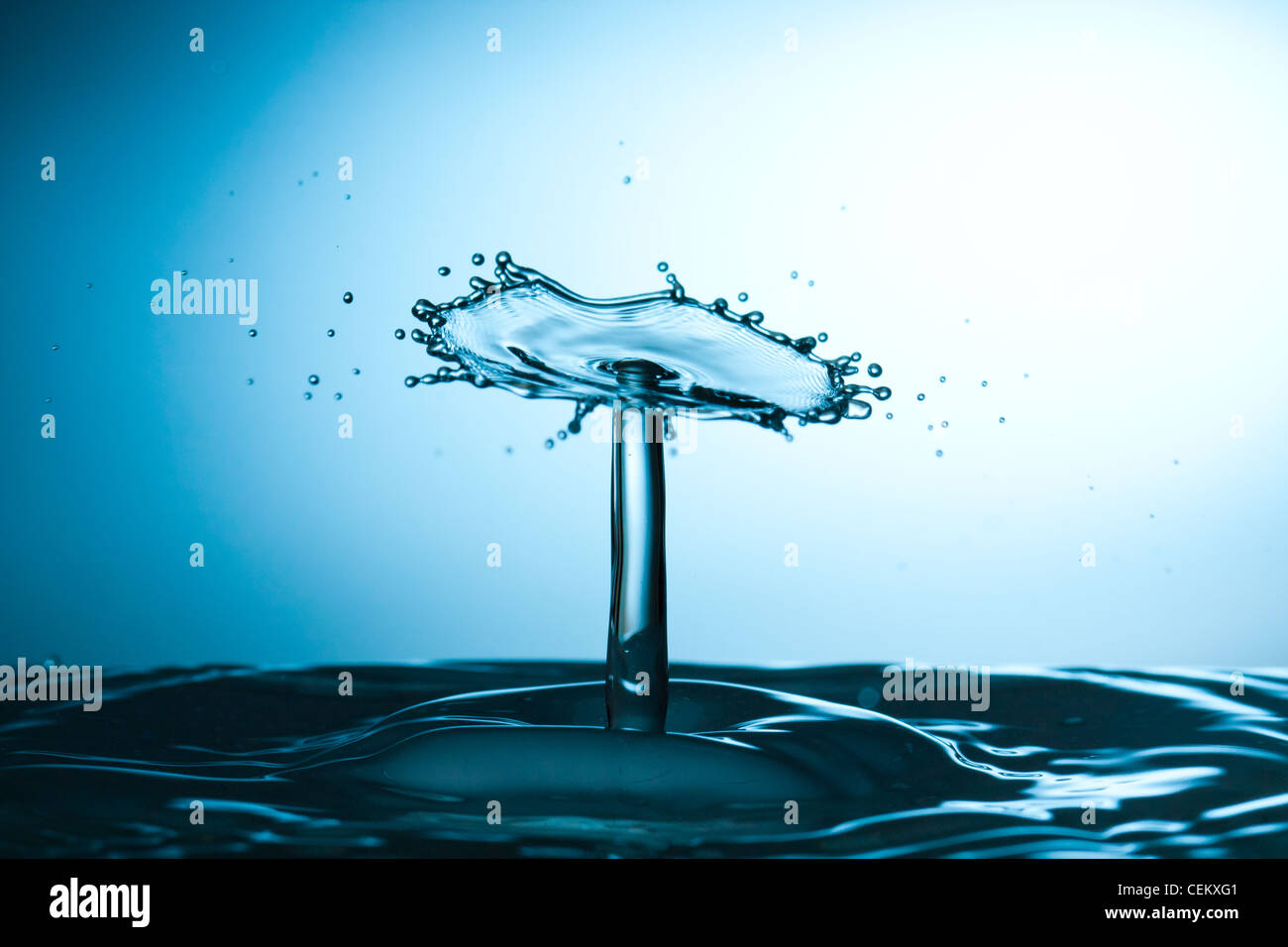 Water drop falling and colliding with another one Stock Photo - Alamy