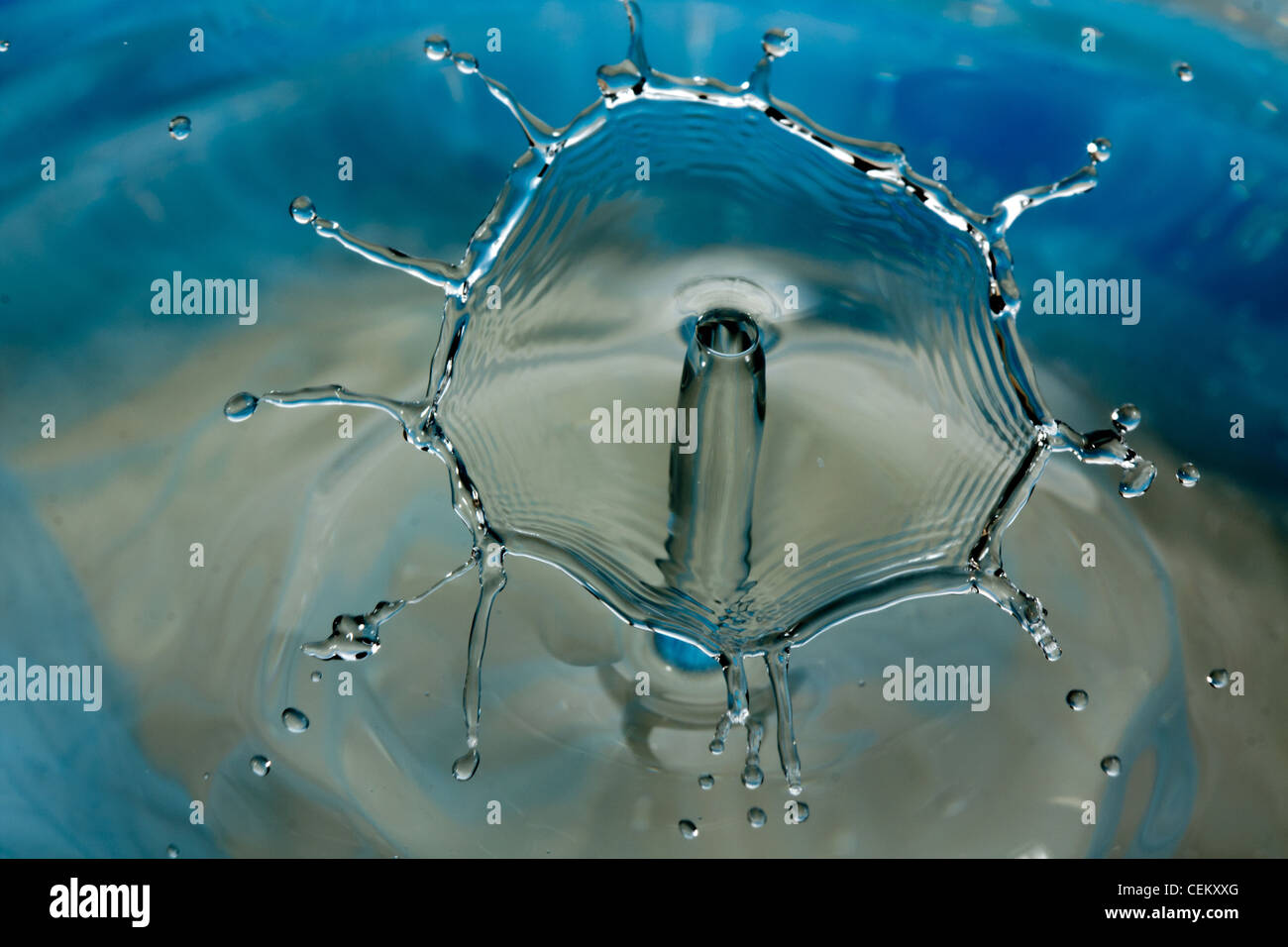 Water drop falling and colliding with another one Stock Photo - Alamy