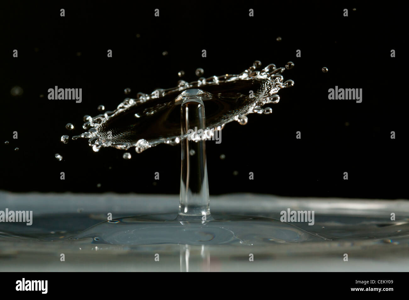 Water drop falling and colliding with another one Stock Photo - Alamy
