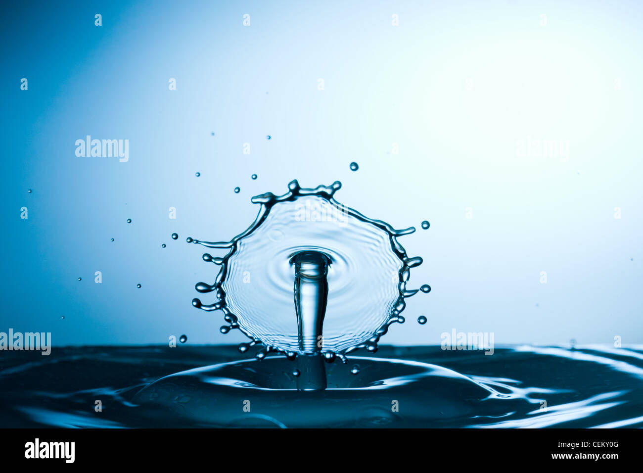 Water drop falling and colliding with another one Stock Photo - Alamy