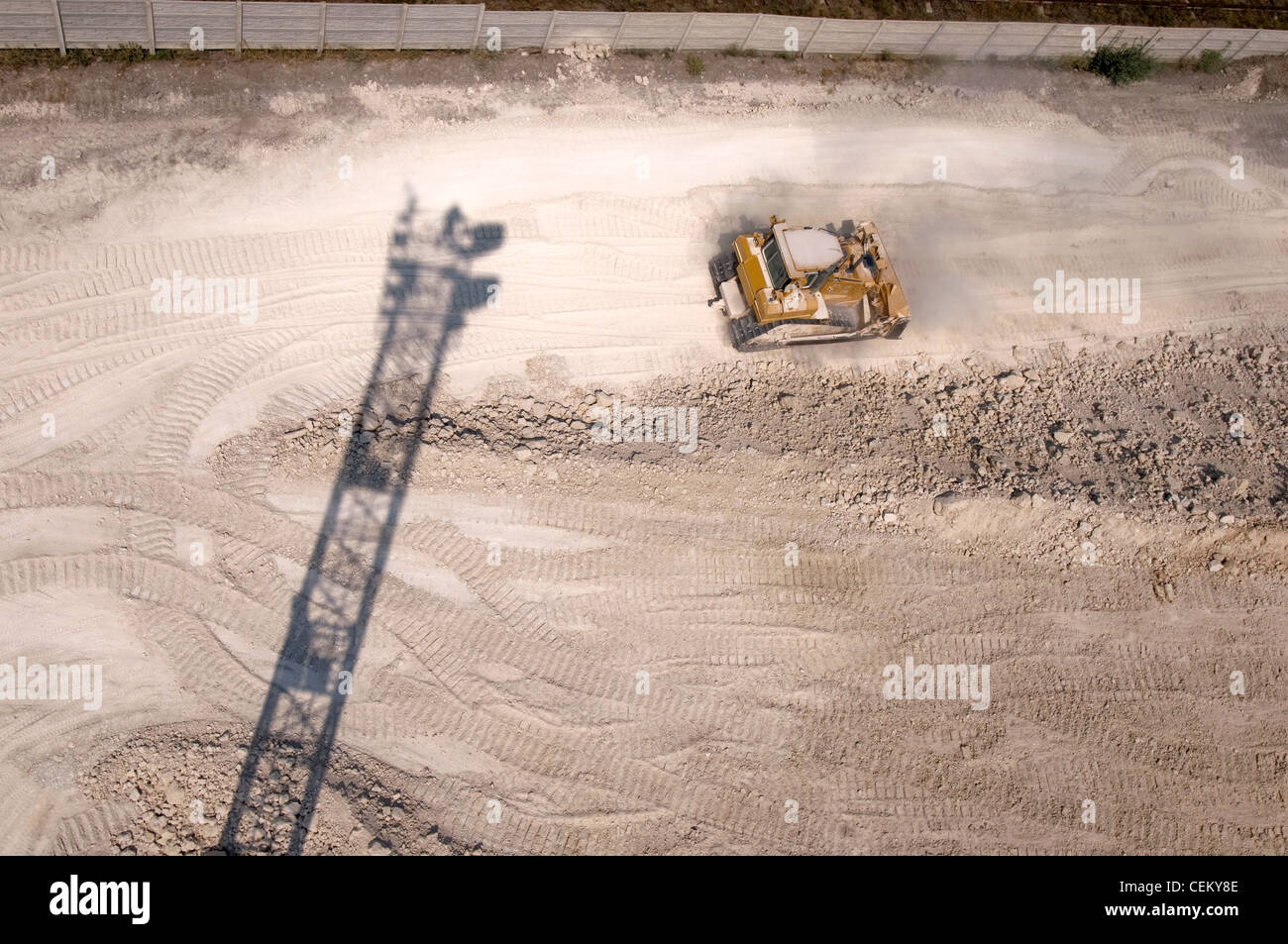 loading machine produces crushed stone for a career Stock Photo - Alamy