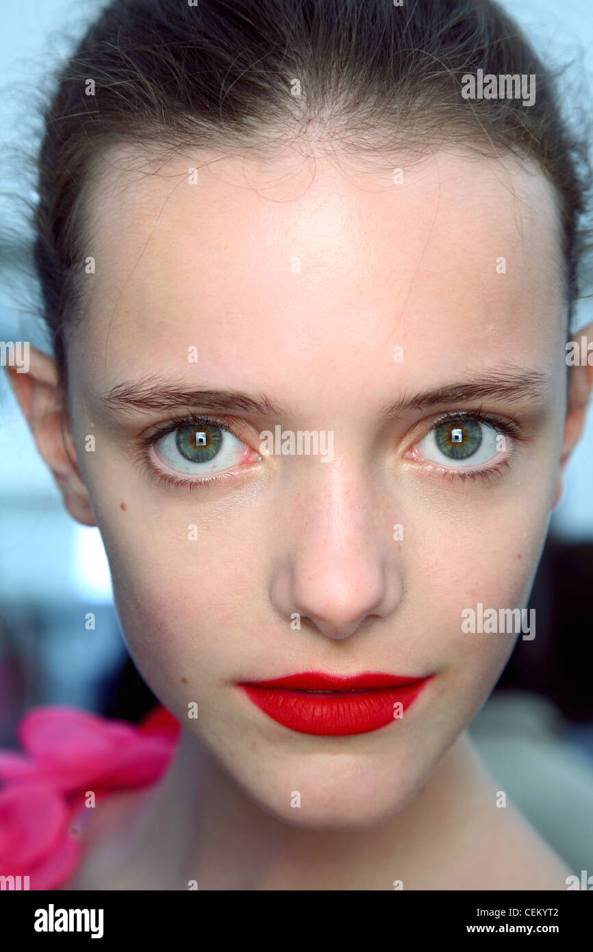 Close up face of bare face female wearing bright red lipstick Stock ...