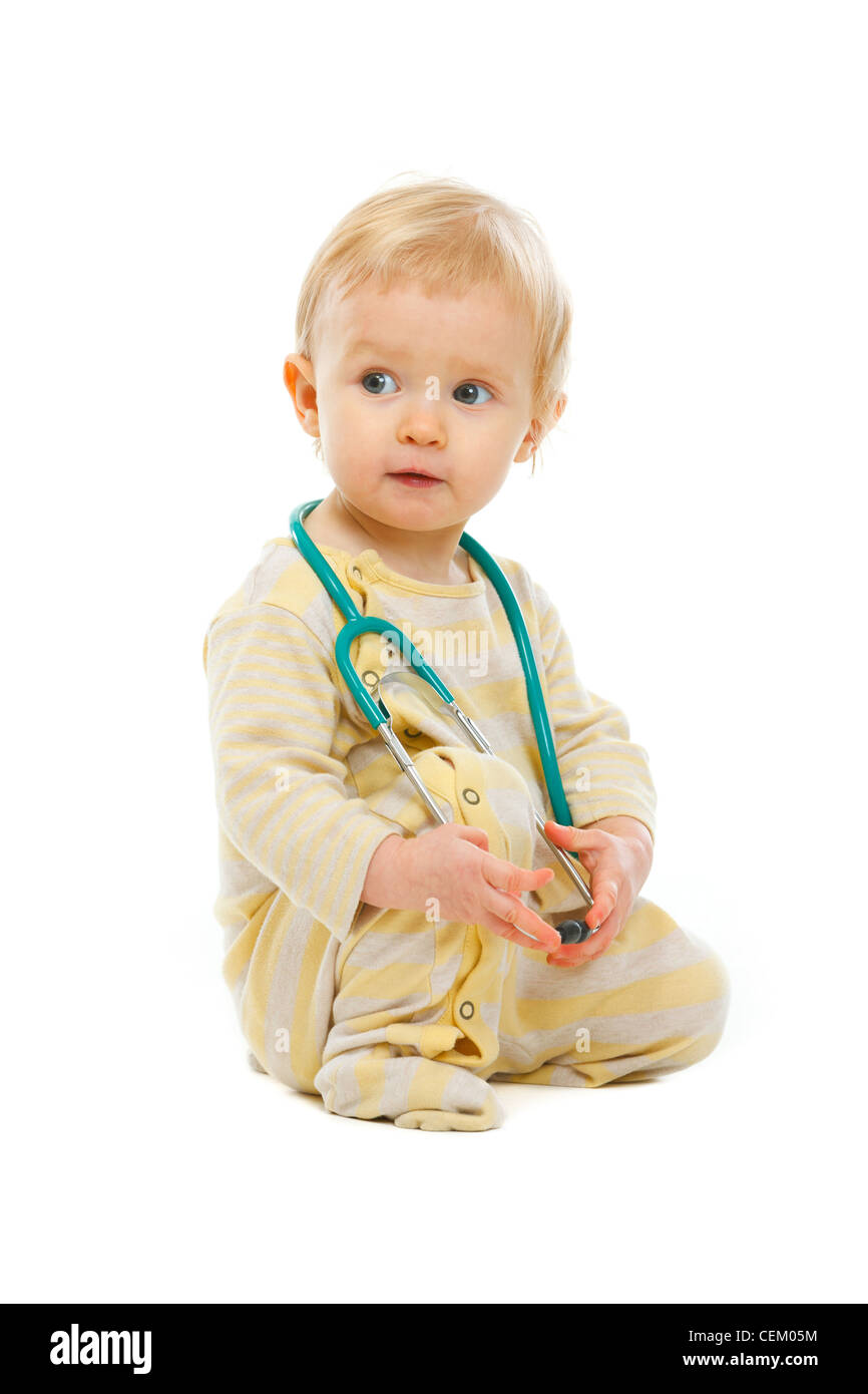 Baby with stethoscope looking on side isolated on white Stock Photo - Alamy
