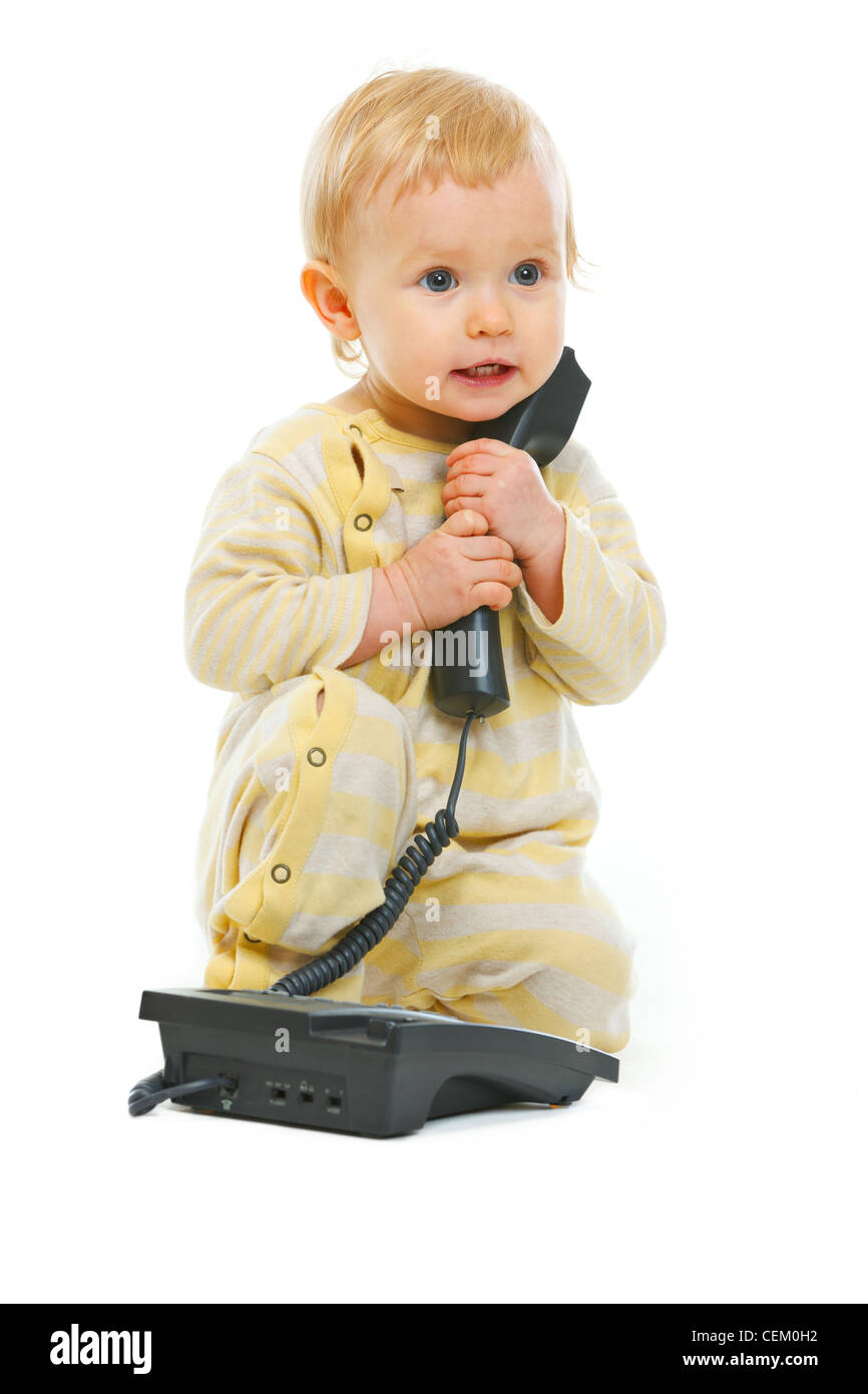 Adorable baby with phone isolated on white Stock Photo - Alamy