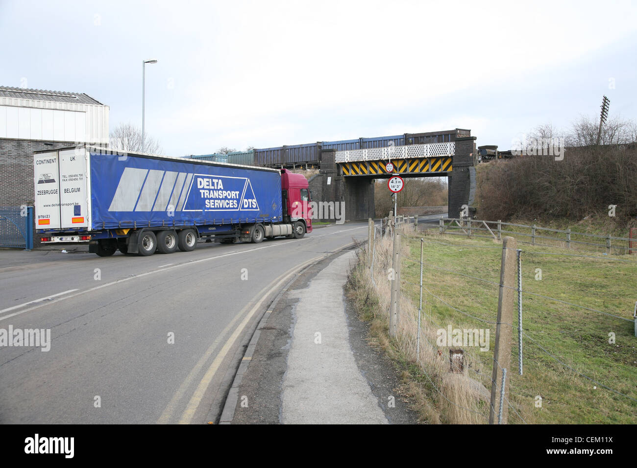 a lorry reverses from a low bridge because he cant fit underneath Stock ...