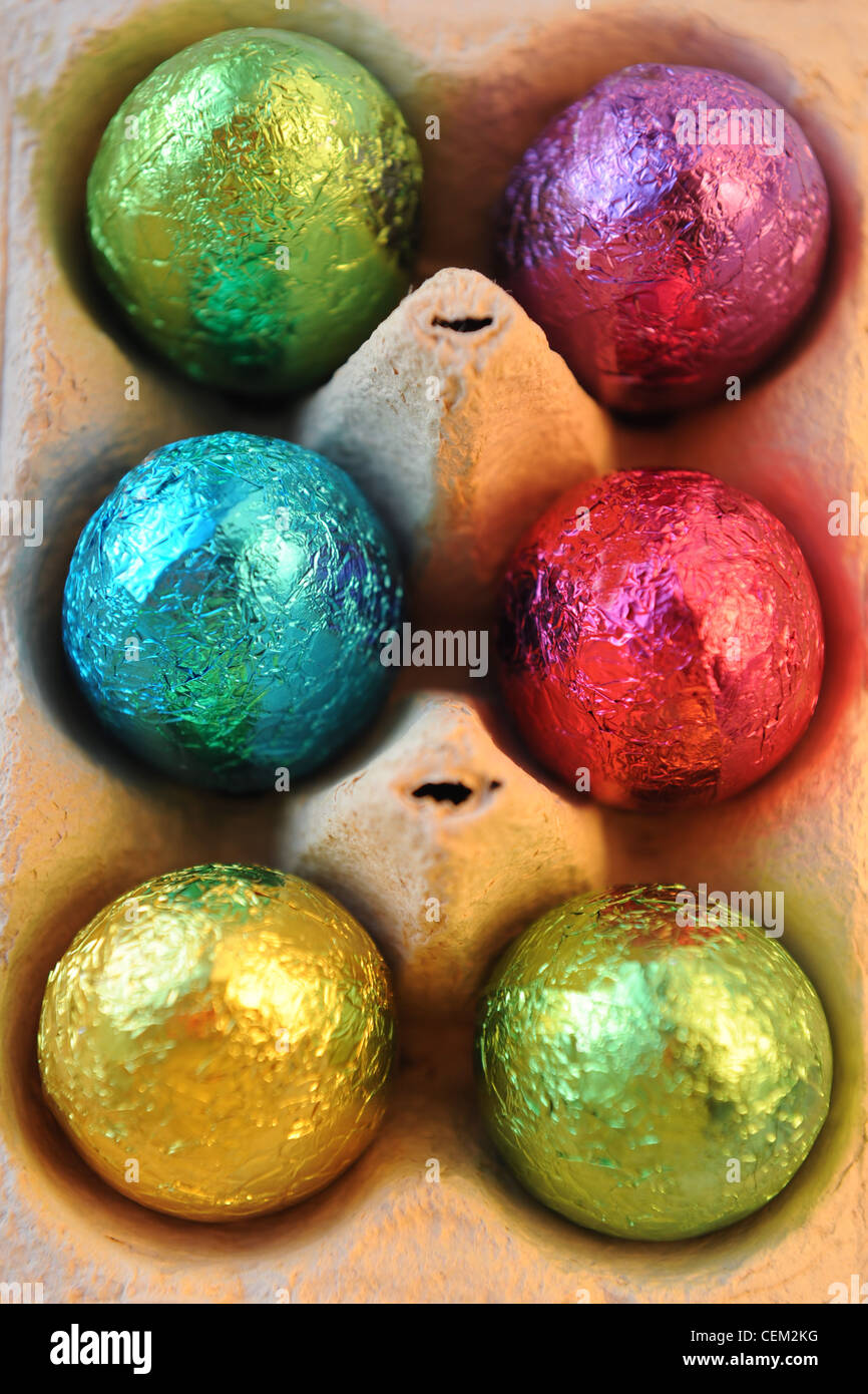 A close up image of a six easter eggs wrapped in colourful foil Stock ...