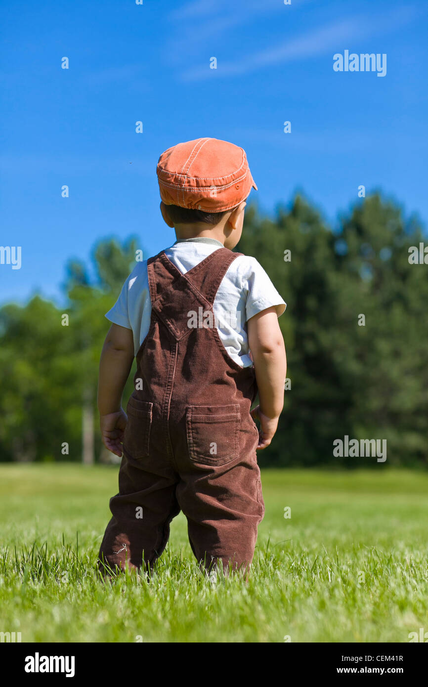 Country boy in overalls hi-res stock photography and images - Alamy