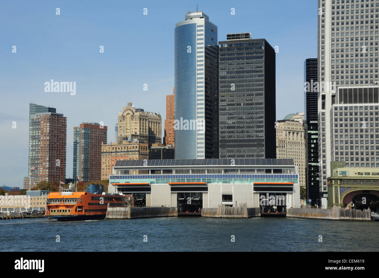 Boat orange ferry moving entering ferry slip left side terminal hi-res ...
