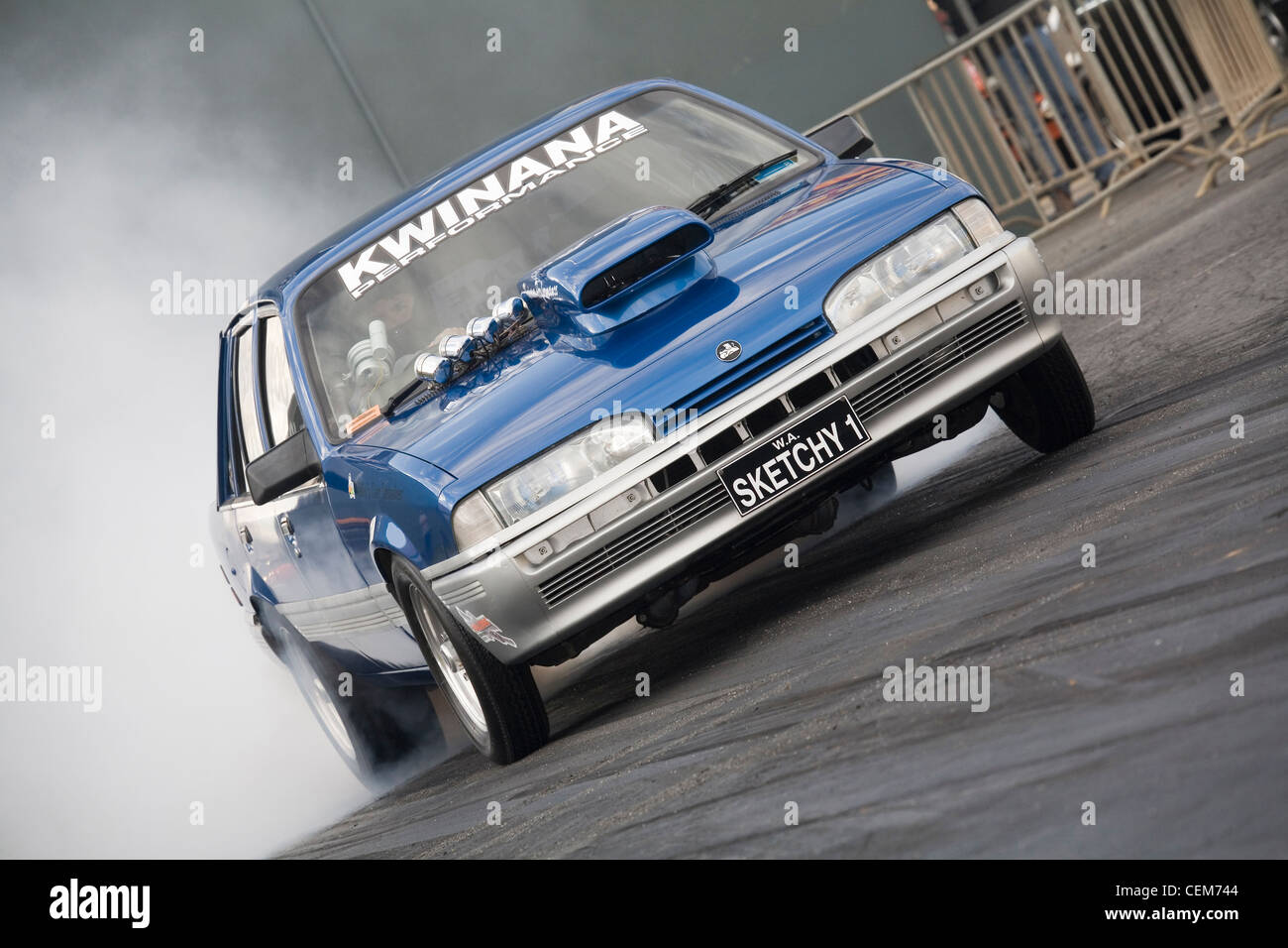 Australian Holden Commodore drag race racing car performing a burnout ...