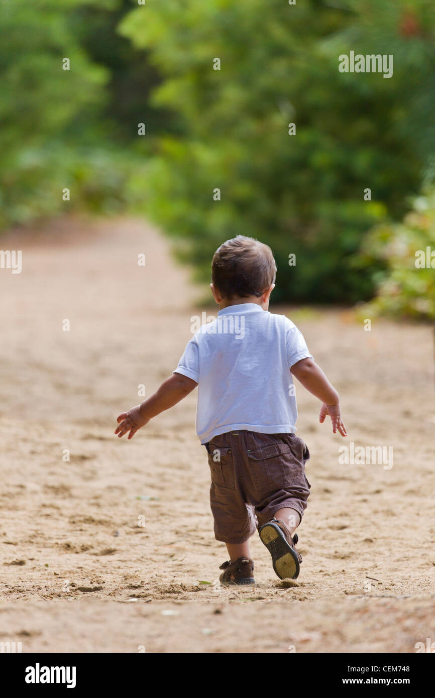 Toddler walking on trail Stock Photo - Alamy