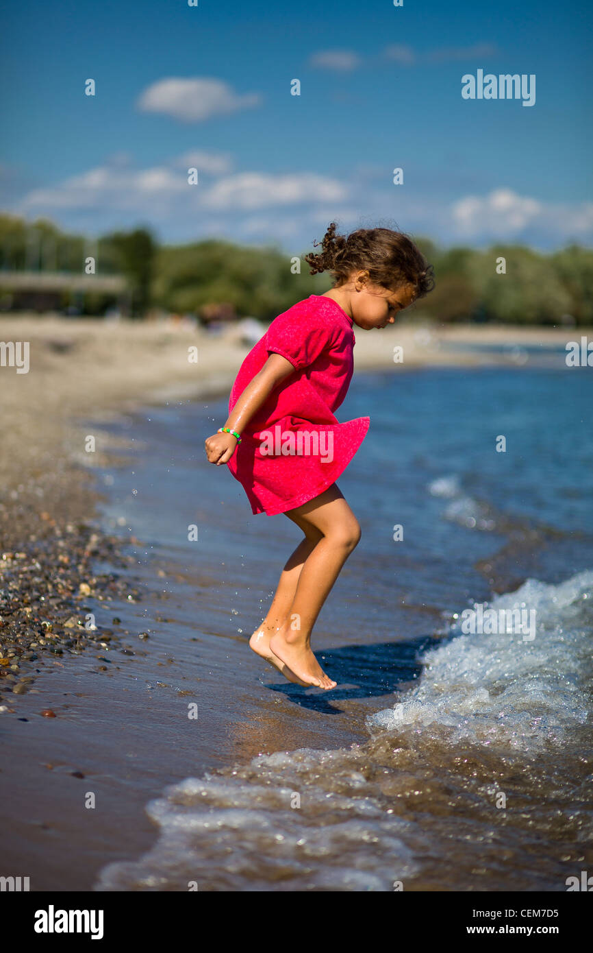 Child leaping water hi-res stock photography and images - Alamy
