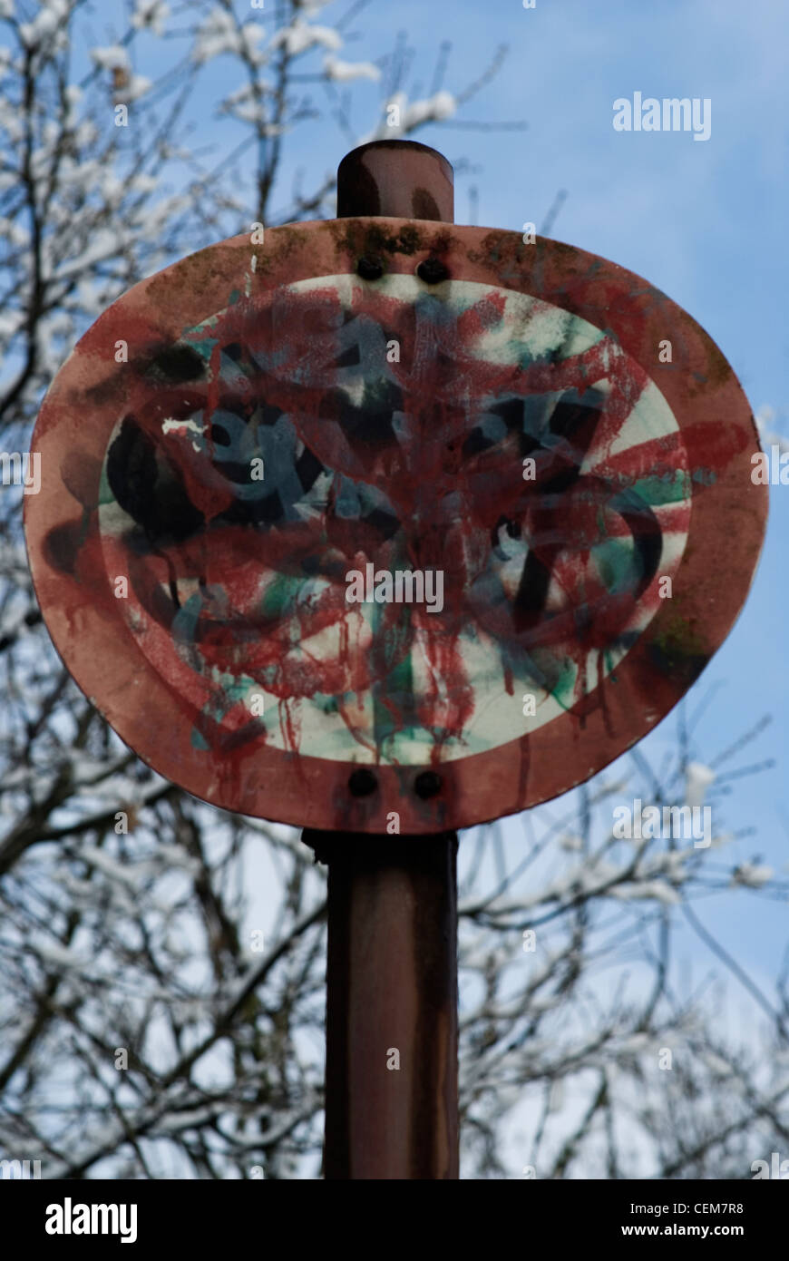graffiti on a pedestrian street sign Stock Photo - Alamy