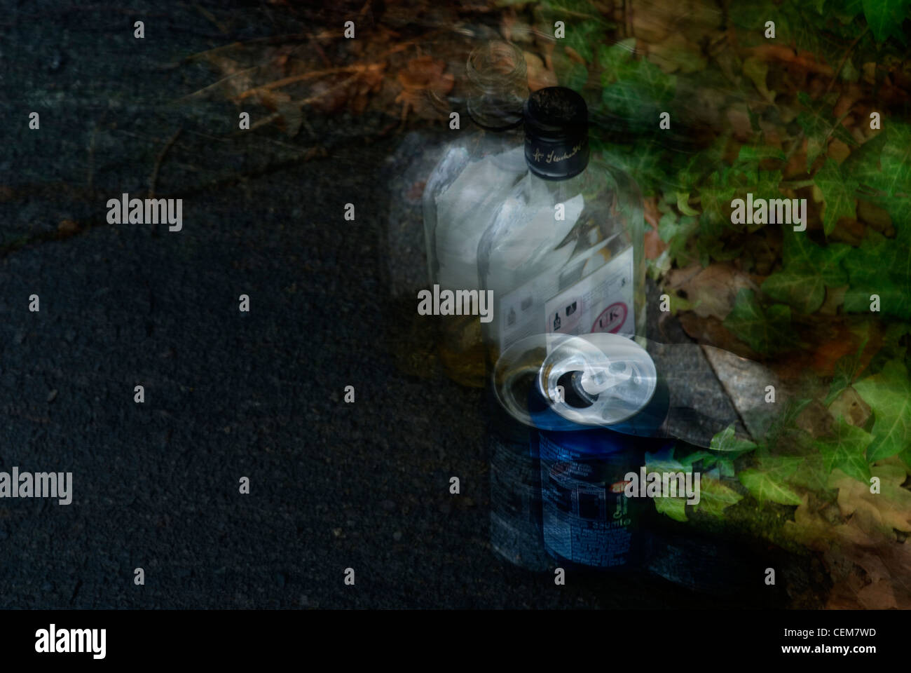 teenage drinking - alcohol left on the side of the road Stock Photo - Alamy