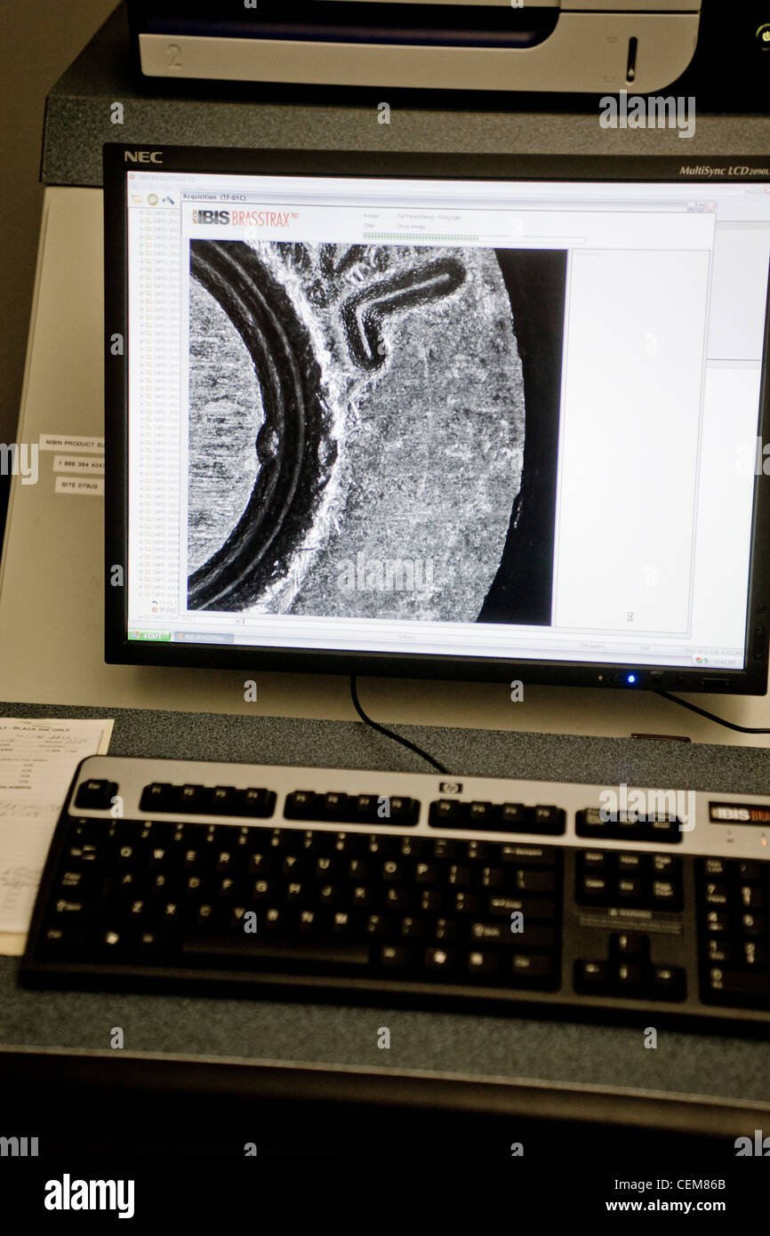 Microscopic details on a cartridge case from a crime scene are revealed ...