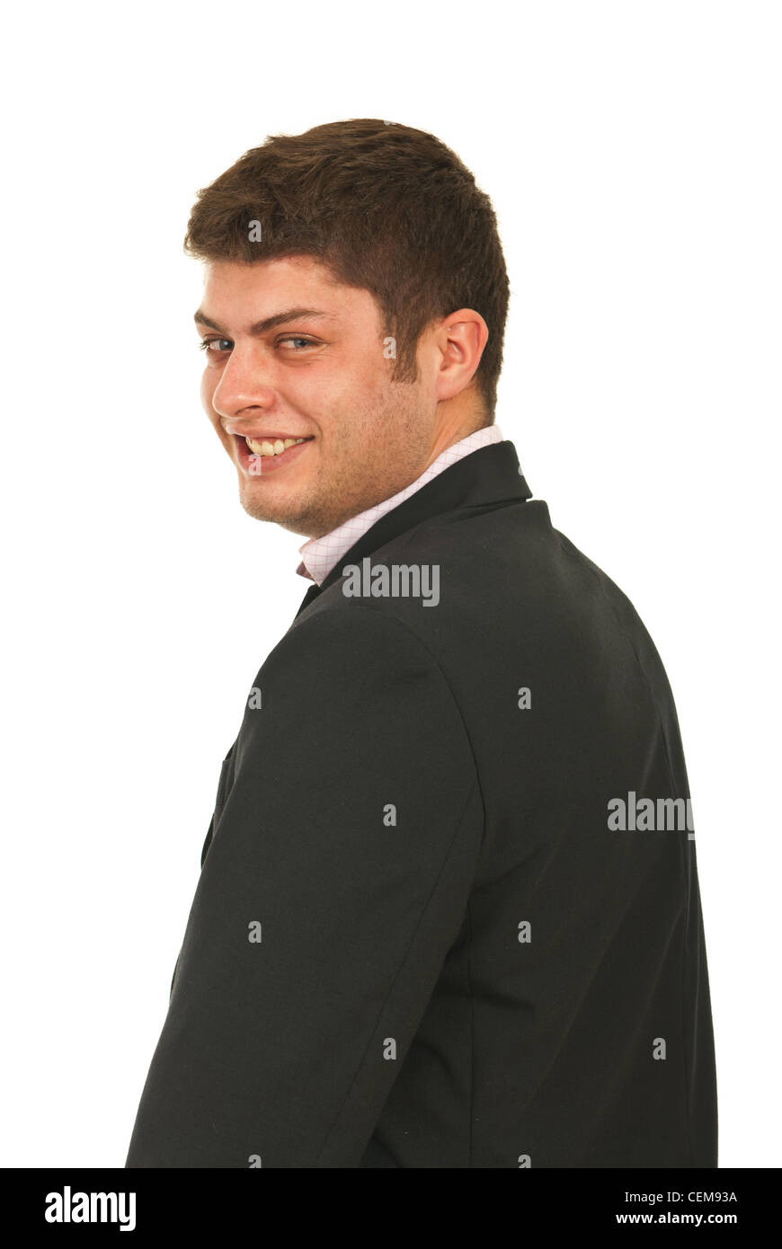 Laughing business man looking back over his shoulder isolated on white ...