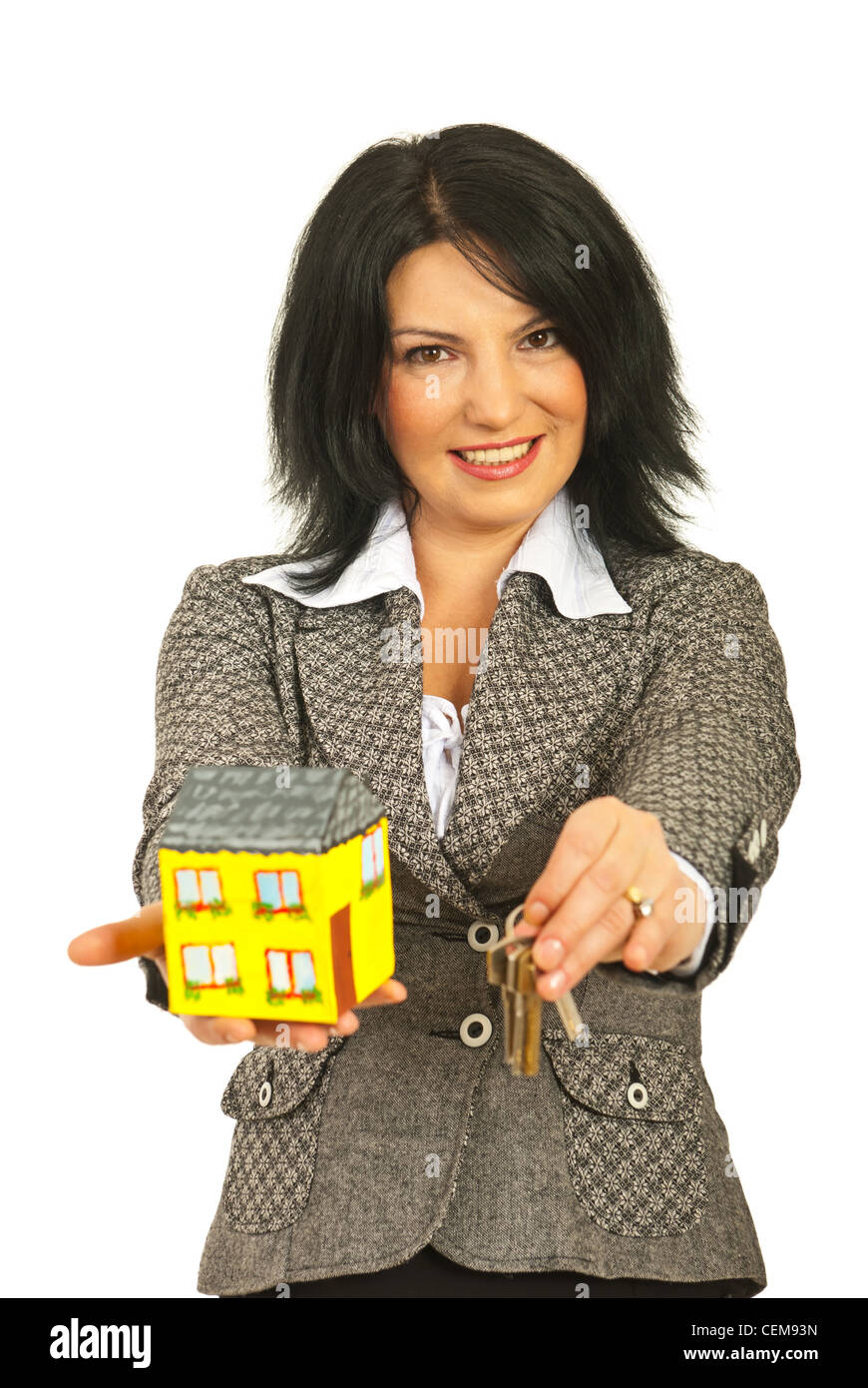 Real estate worker woman offering keys and home isolated on white ...