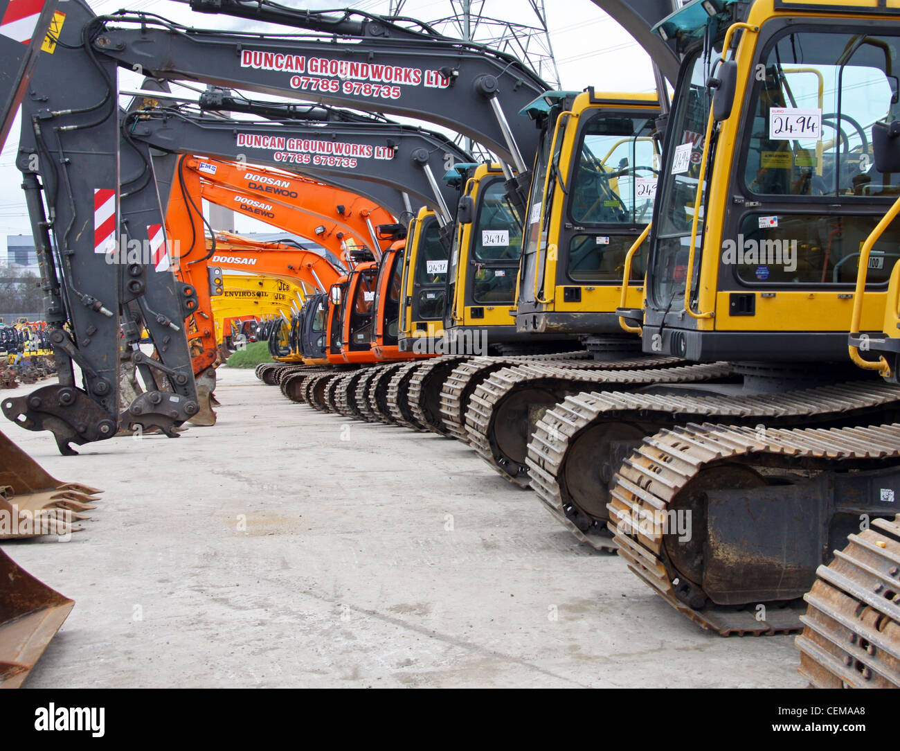 Yellow diggers hi-res stock photography and images - Alamy