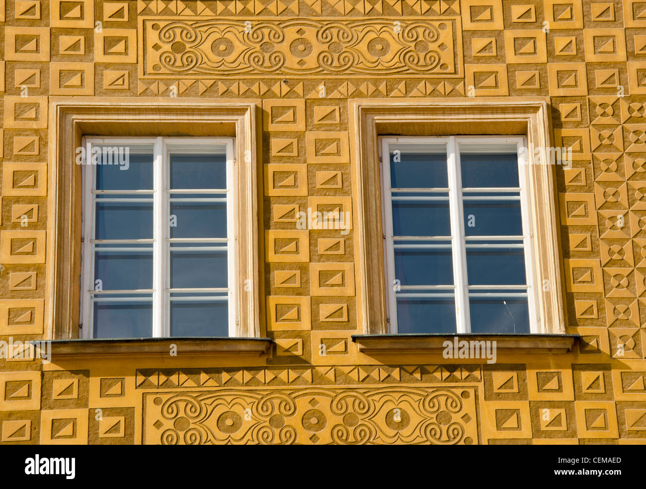 Ancient building architectural decorative windows ornamented yellow ...