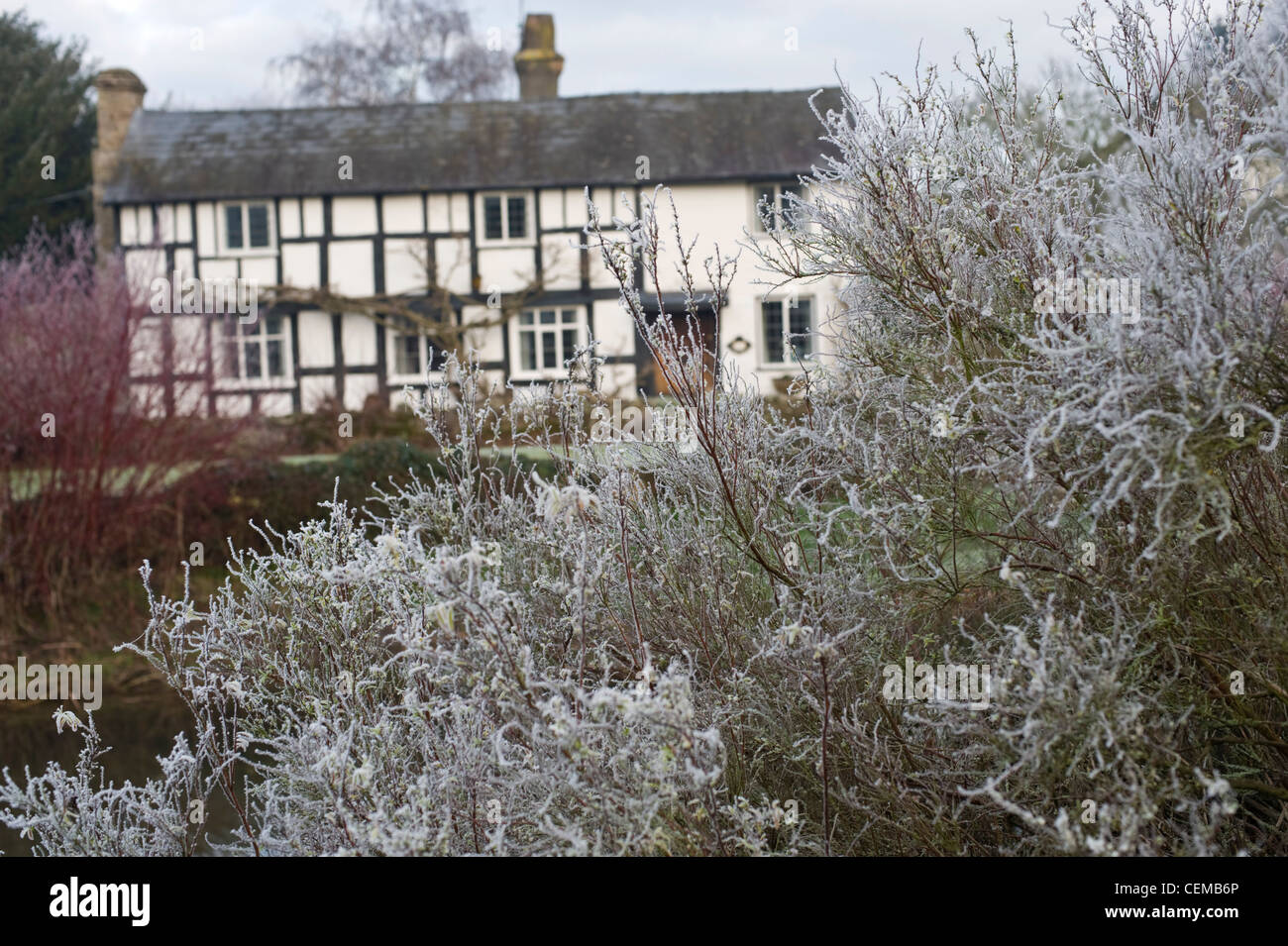 Timber framed house in picturesque English village on winter morning ...