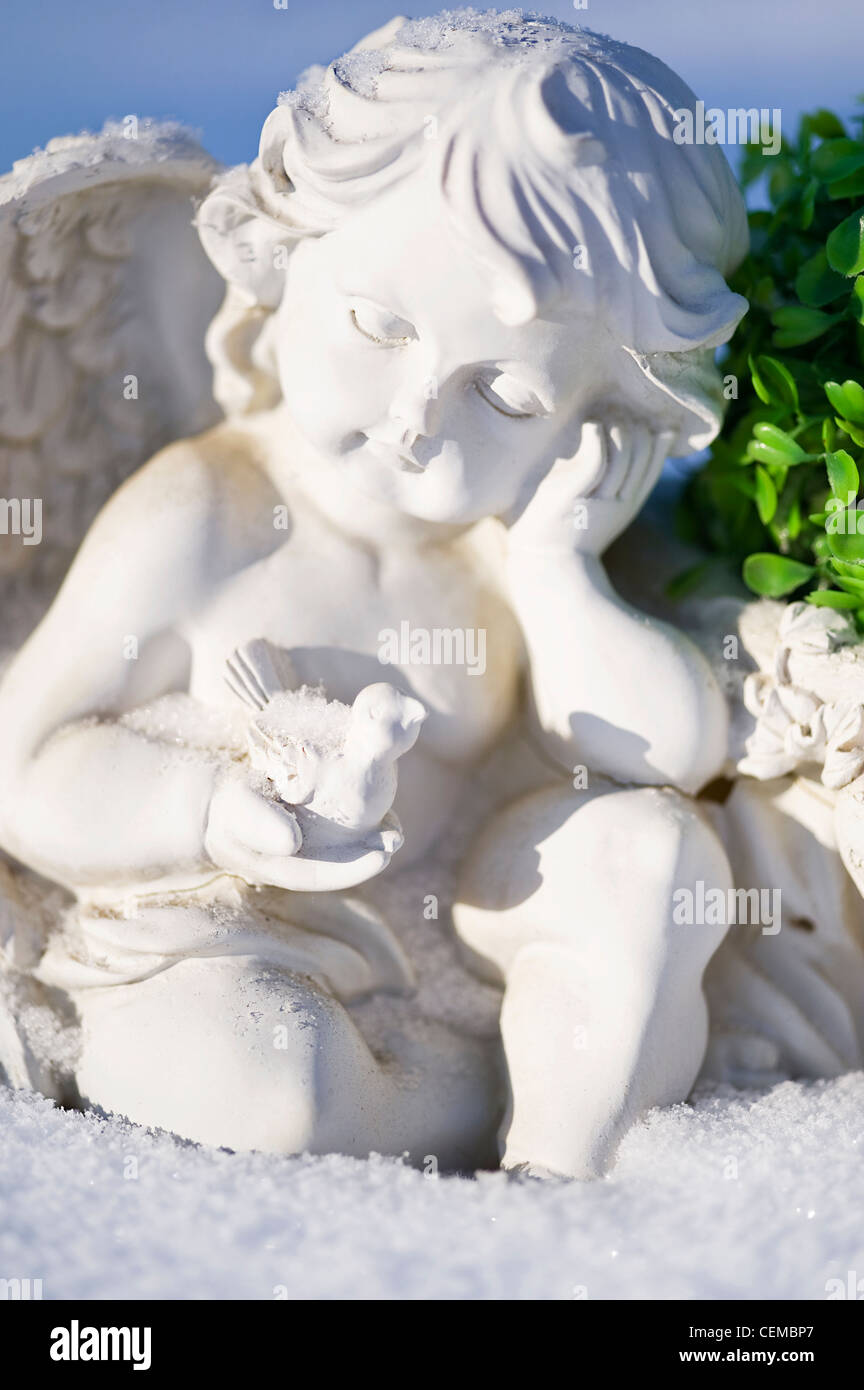 angel in the snow Stock Photo - Alamy
