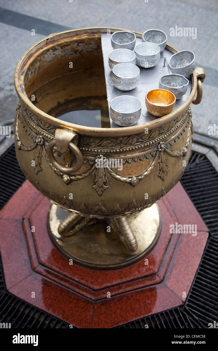 Holy water stoup at The Erawan Shrine Bangkok Stock Photo - Alamy