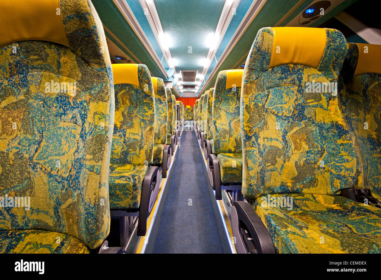 View down the aisle on a coach showing the rows of seating Stock Photo ...