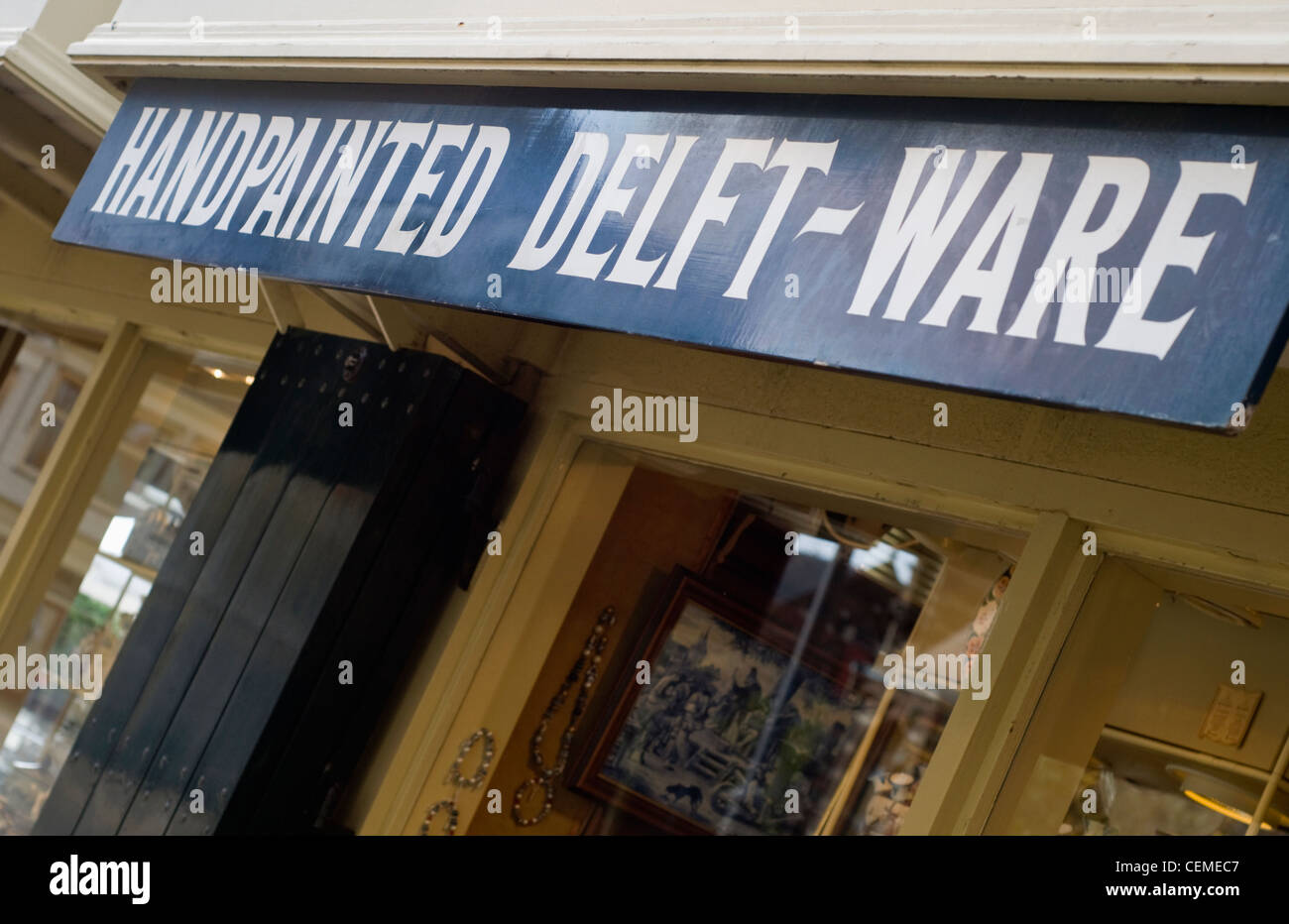 Sign outside a souvenir shop selling traditional Delftware in Delft ...