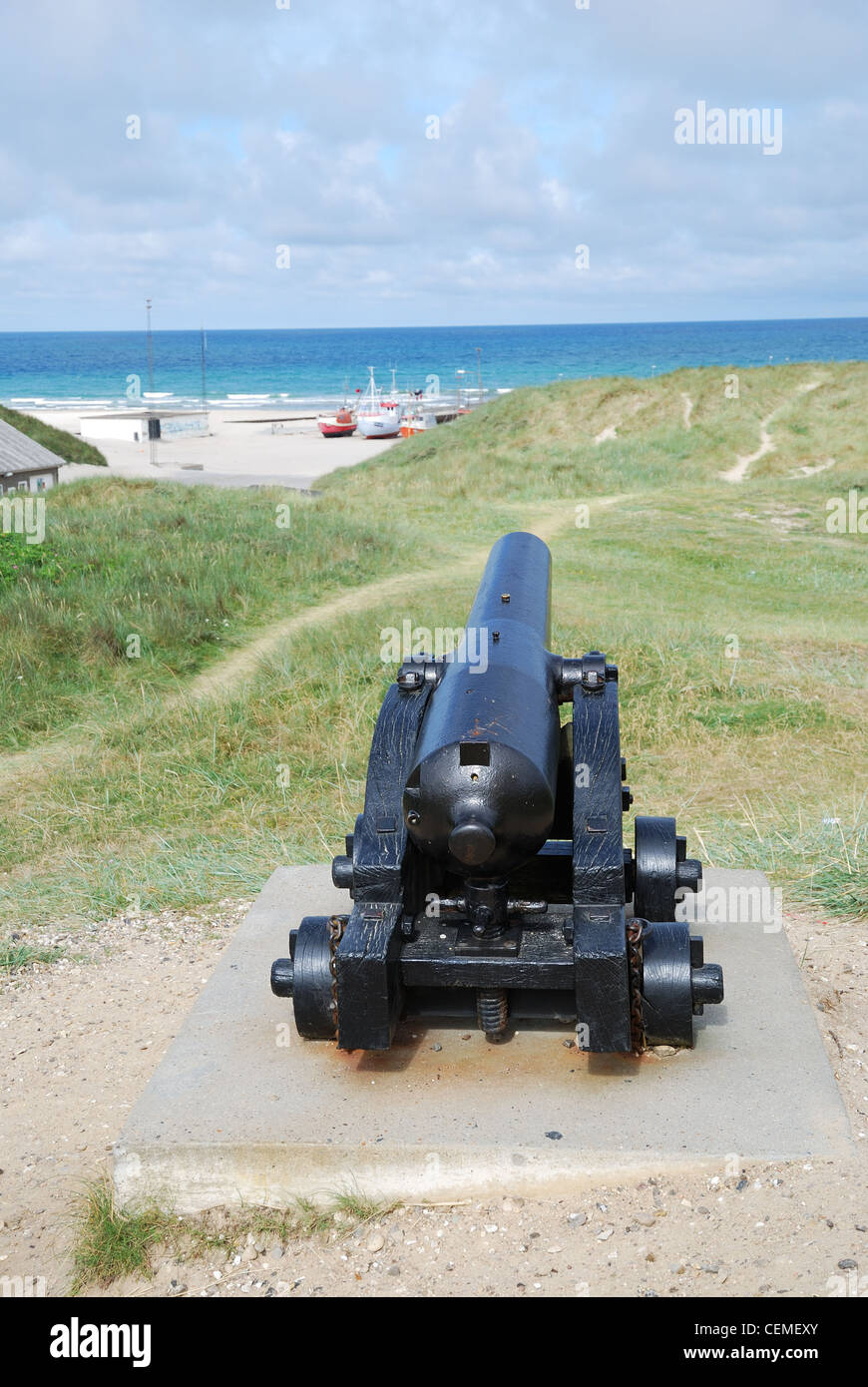 Obsolete cannon on the Danish shore Stock Photo - Alamy