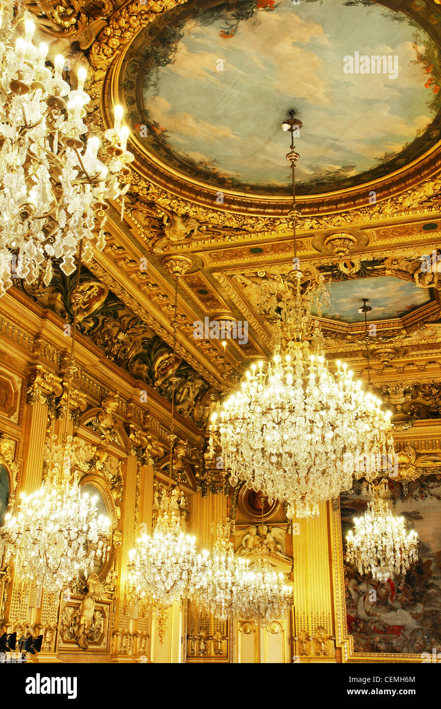 Opulent cristal chandeliers and gold leaves wood carved and painted ...