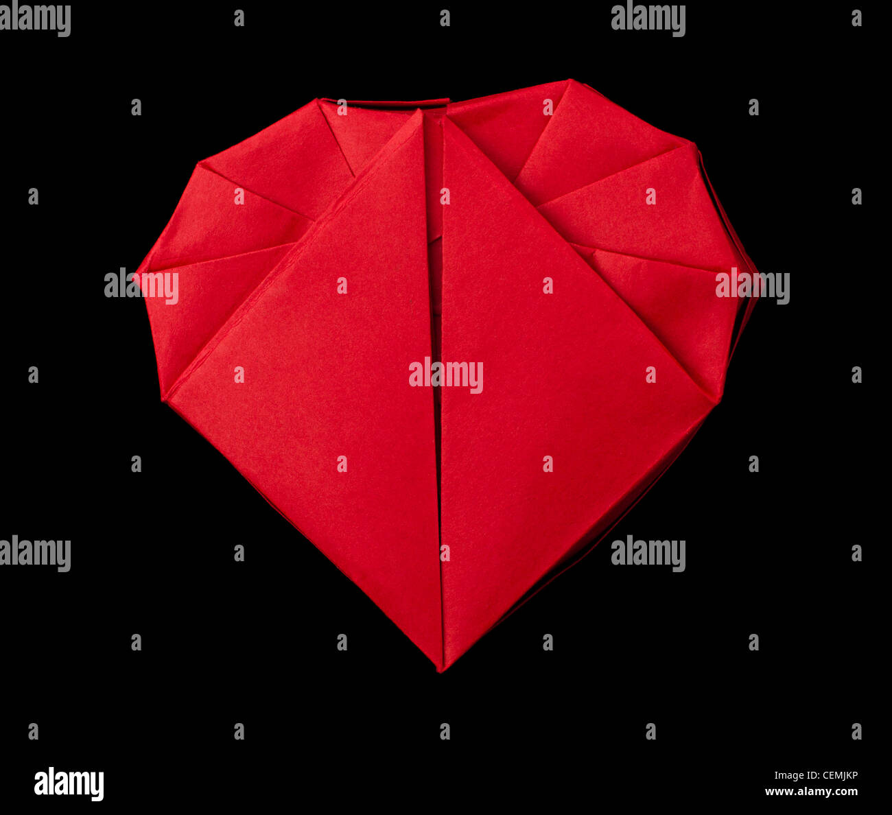 Origami red heart. Black isolated Stock Photo - Alamy