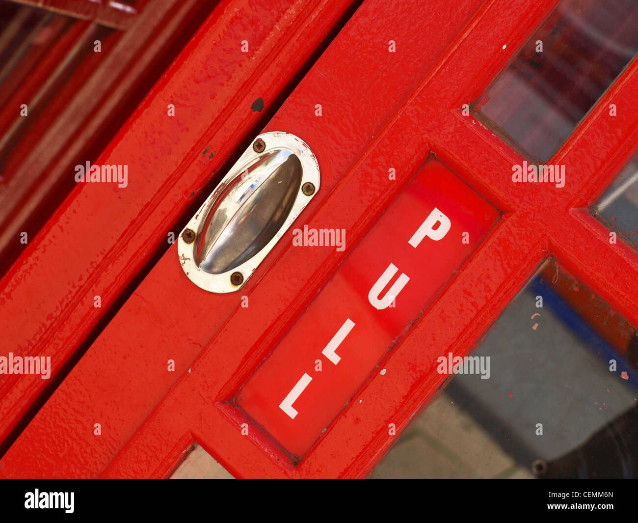 Handle pull red telephone box hi-res stock photography and images - Alamy