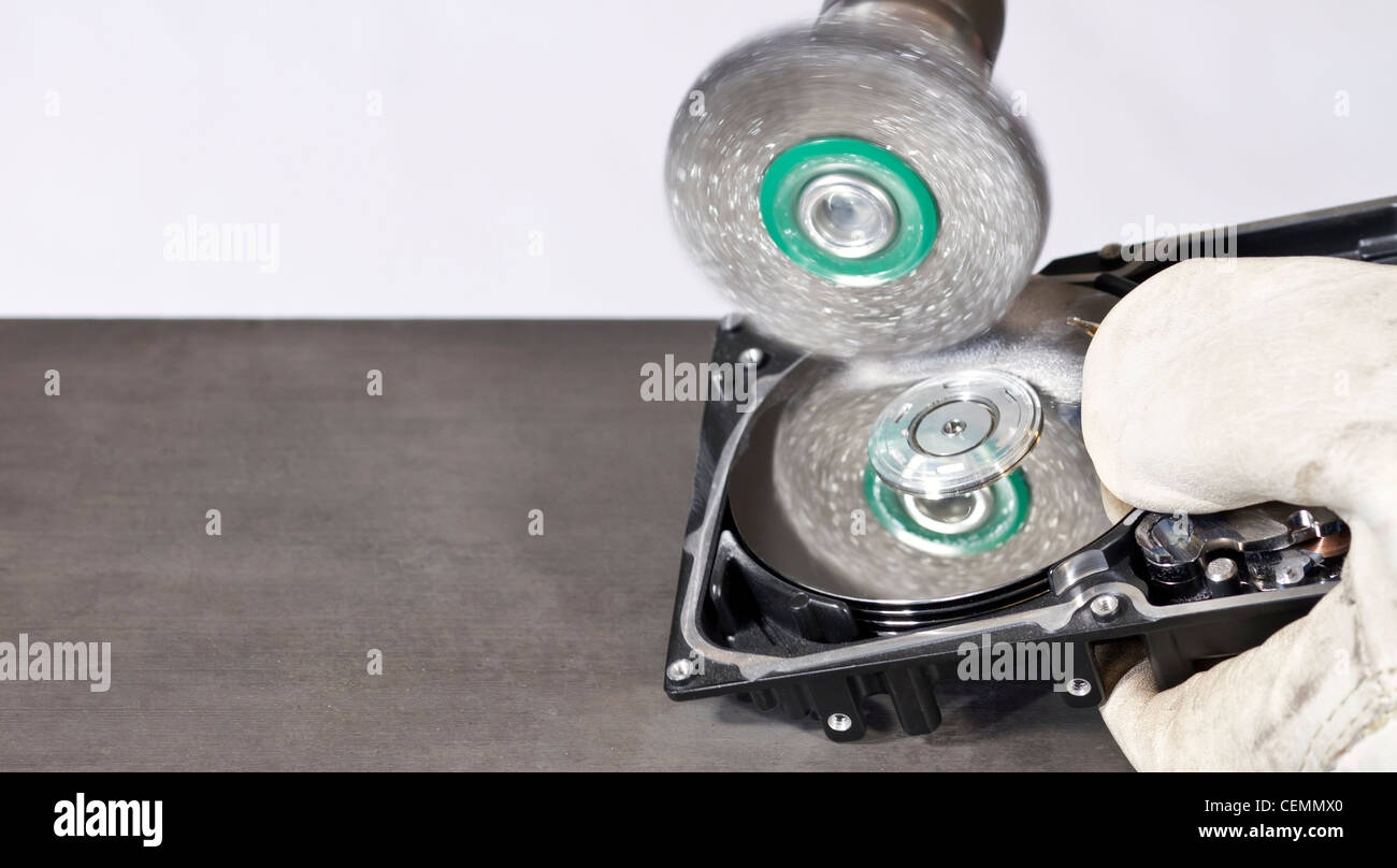opened hard disk drive gets scrubbed Stock Photo - Alamy