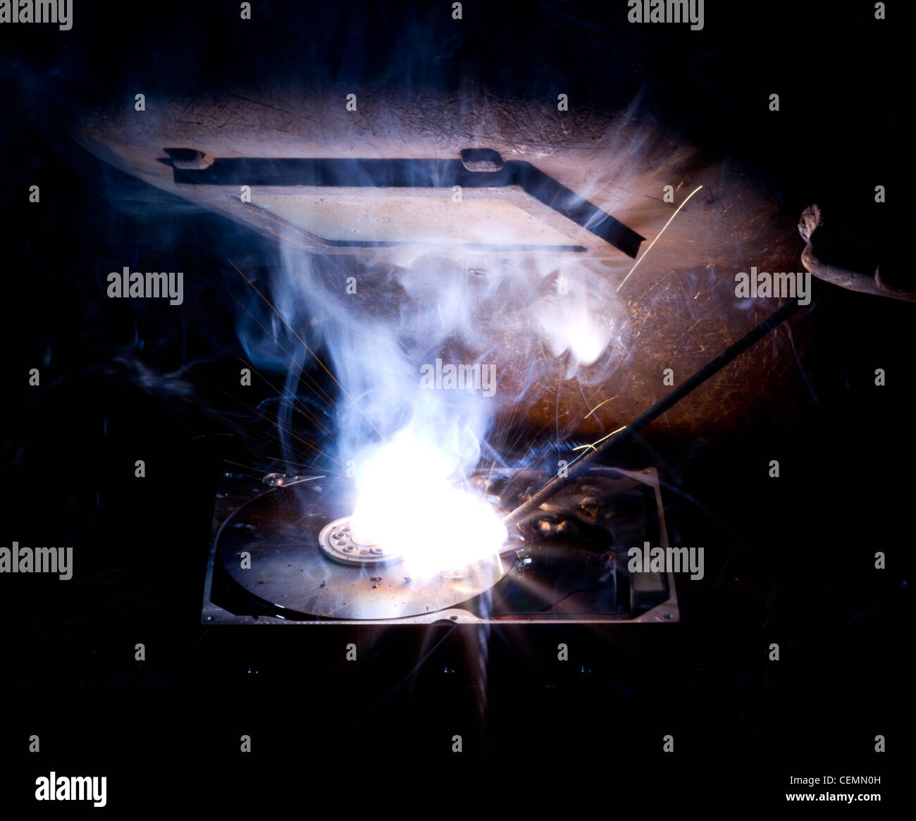 welding scenery with hard disk drive, welding mask detail and flashy ...