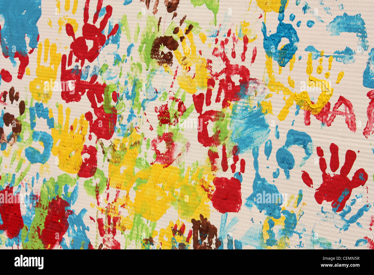 Handprints in different colors in a mural. Background picture Stock ...