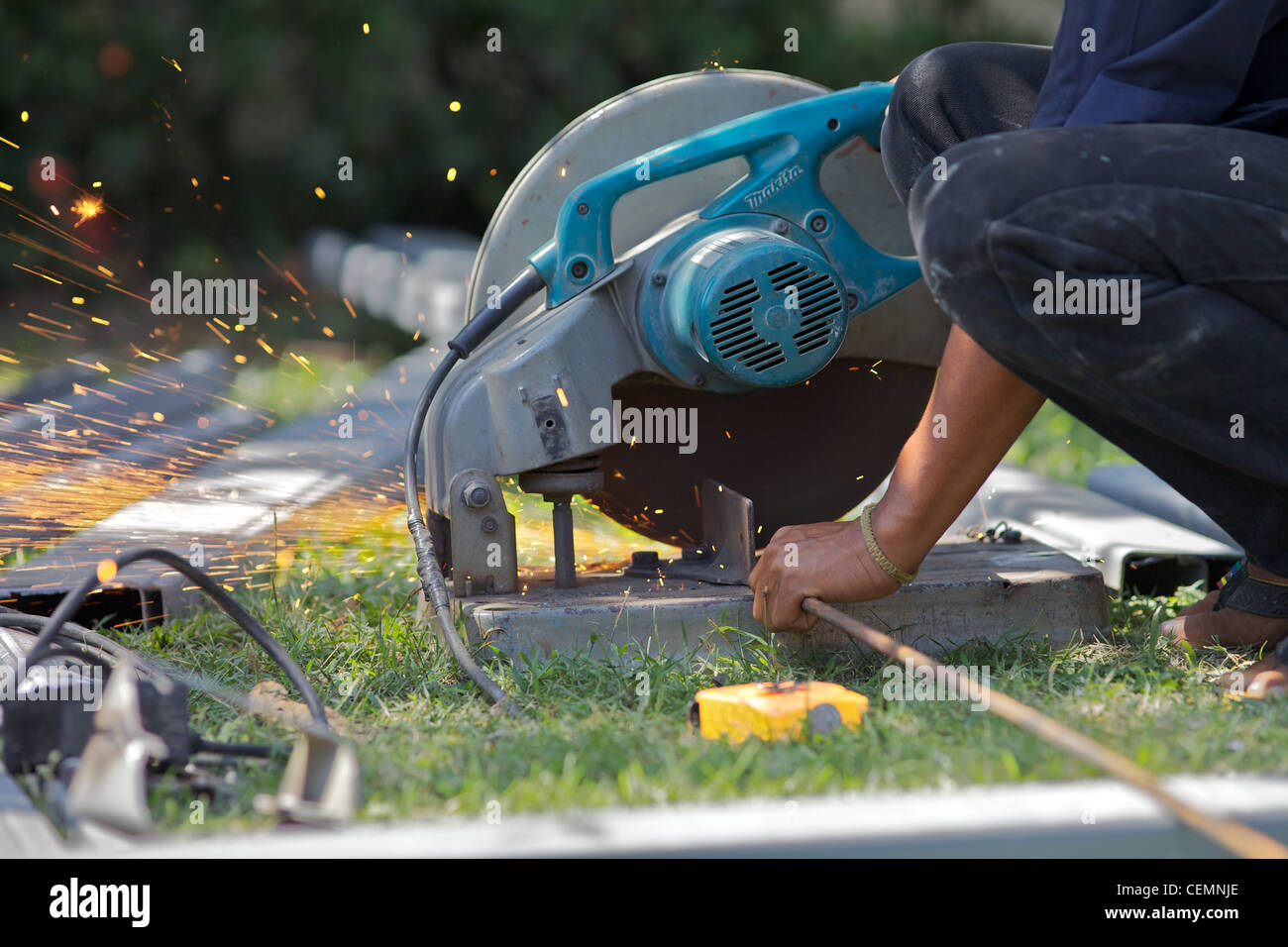 Cutting steel rods on a building site, Phuket, Thailand Stock Photo - Alamy