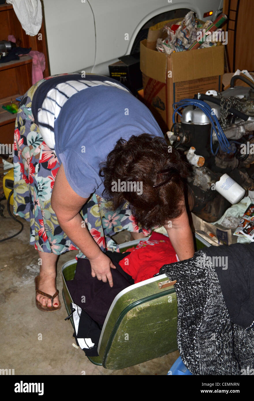 Suitcase packing mess hi-res stock photography and images - Alamy