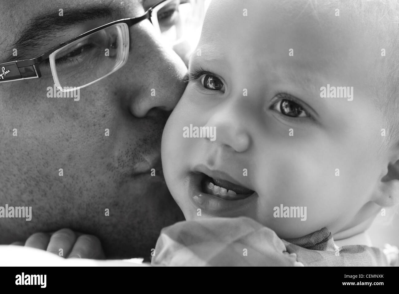 Jeff Holding His Daughter Ruby While Matt Is Holding His