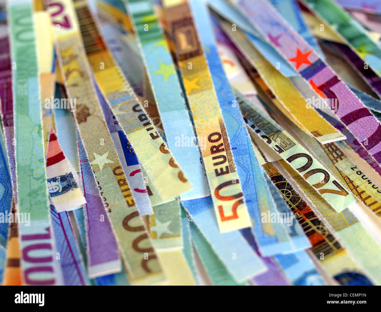 Money to burn - banknotes cut with a paper shredder Stock Photo - Alamy