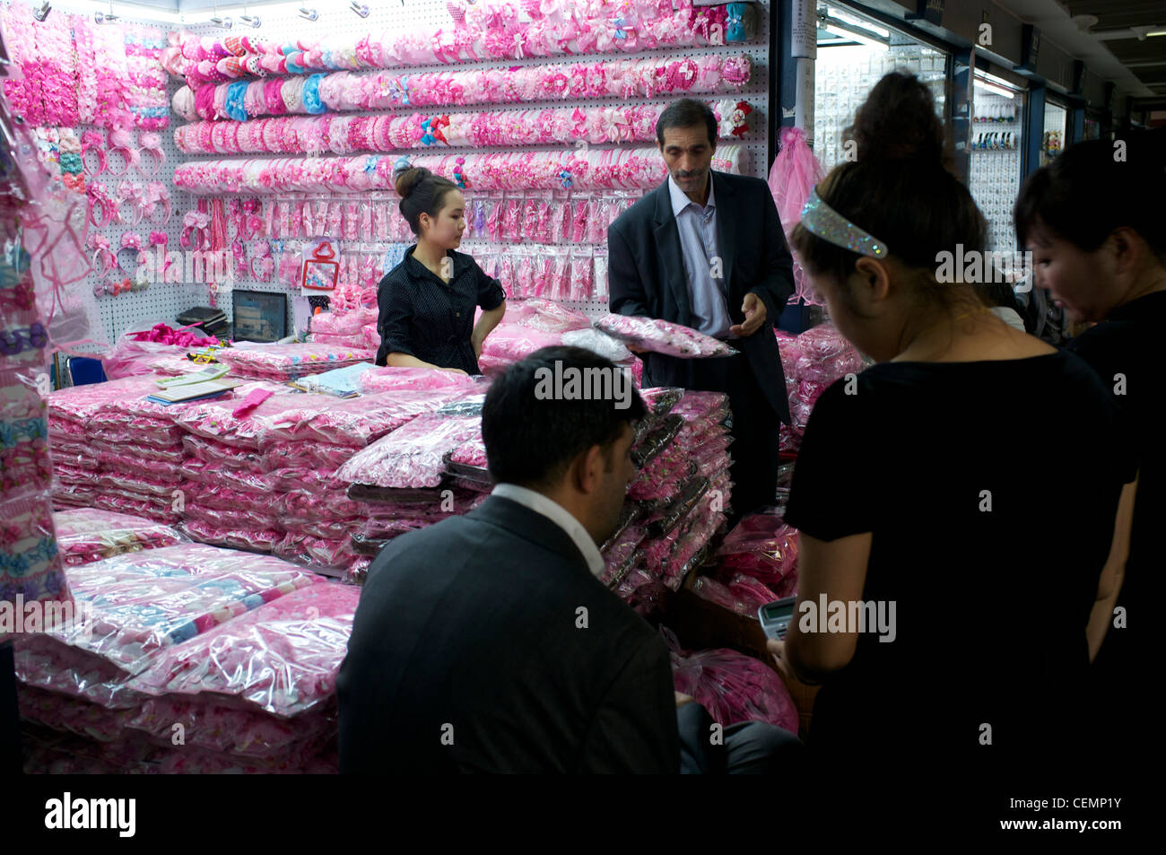 Arabic merchants purchase at a fashion accessories store in Yiwu Market ...