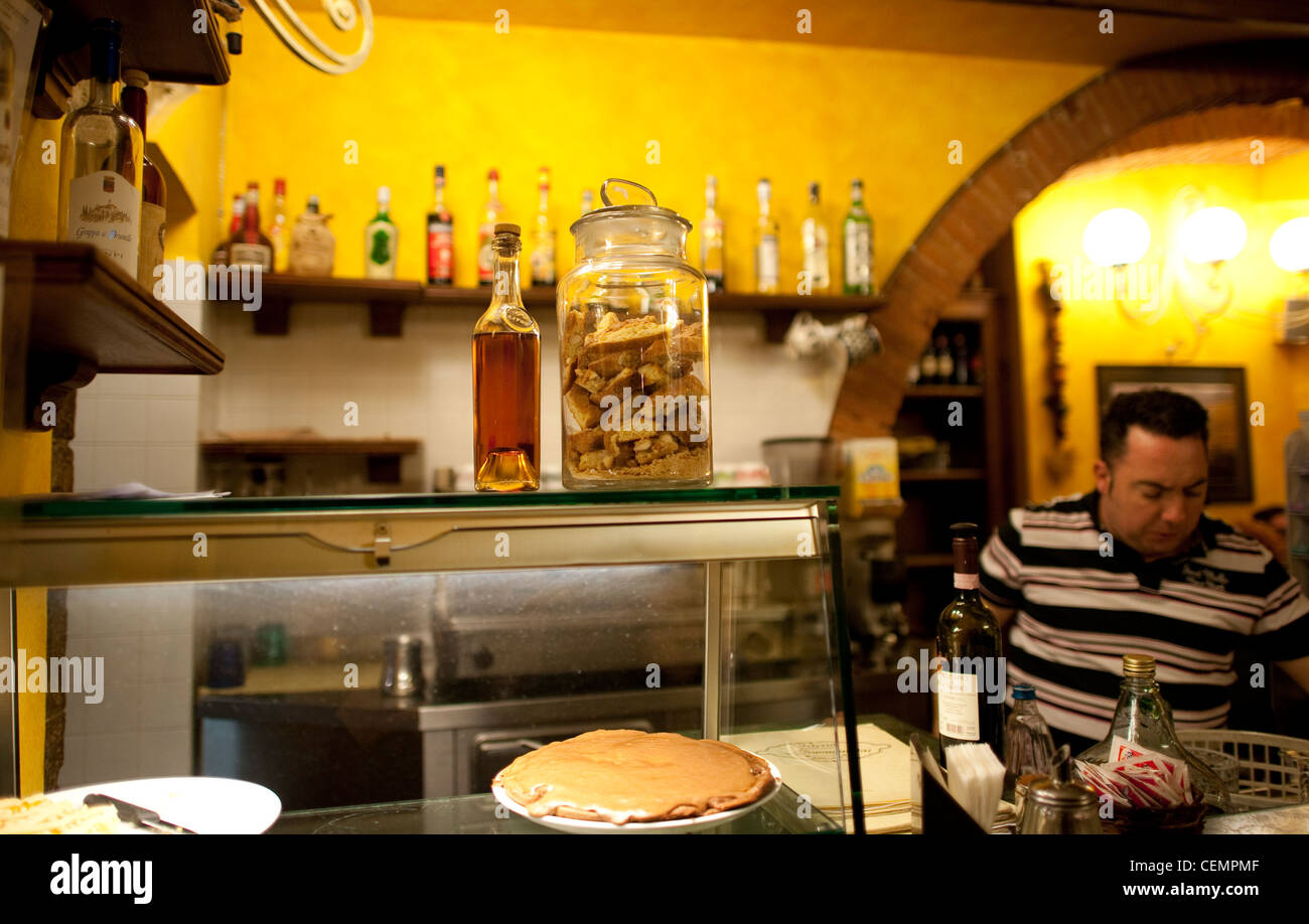 Florence restaurant bar with biscotti on the counter with desert wine ...