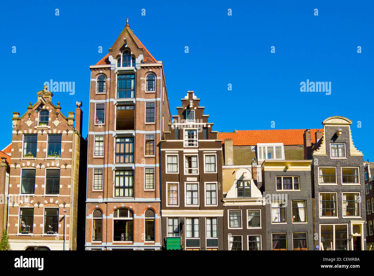 canalside buildings and warehouses in central Amsterdam Holland The ...