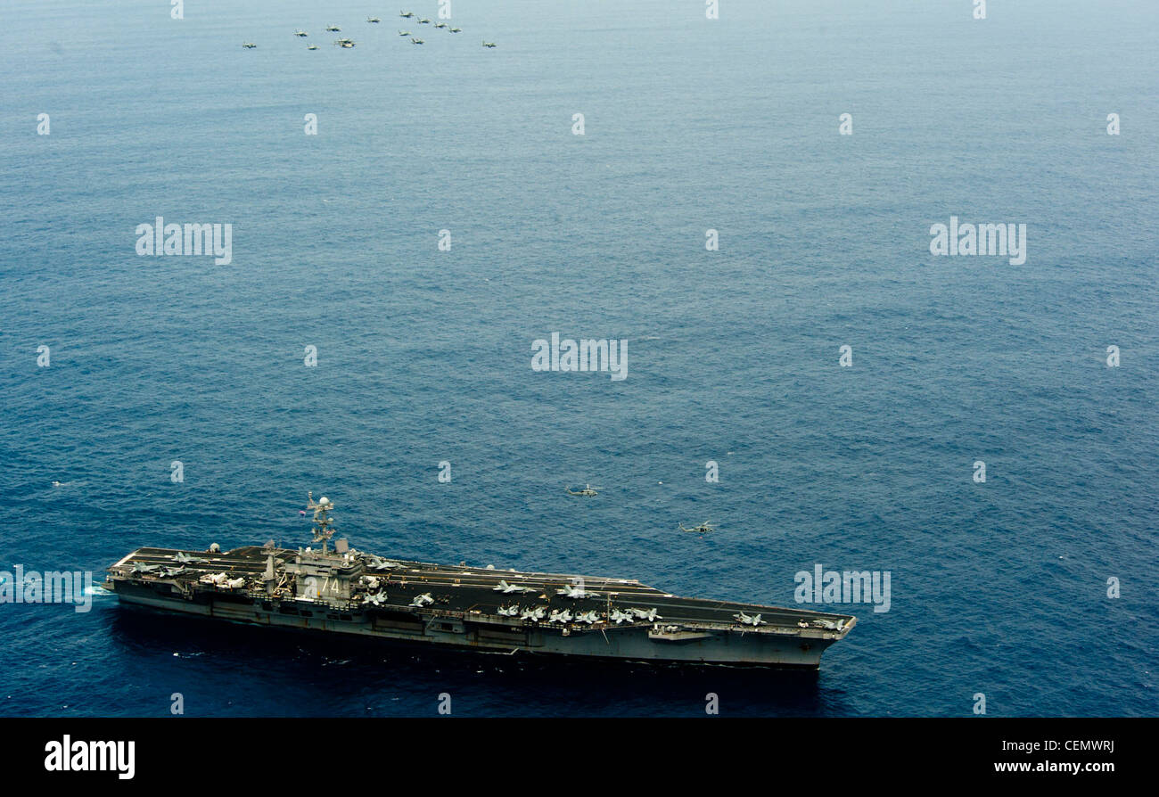 The Nimitz-class aircraft carrier USS John C. Stennis (CVN 74) transits the Pacific Ocean as ...
