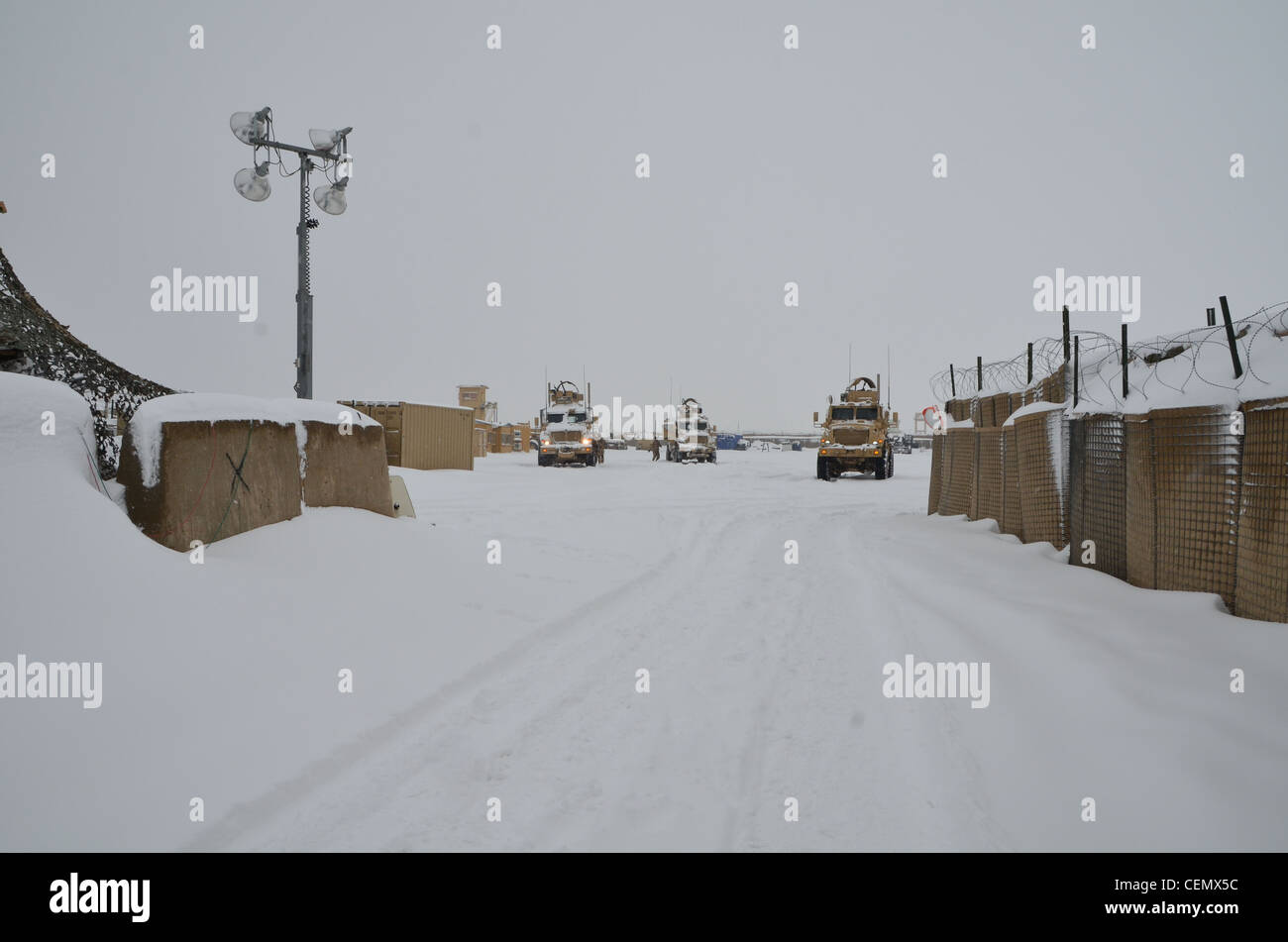 A thick blanket of snow covers the ground on Forward Operating Base ...