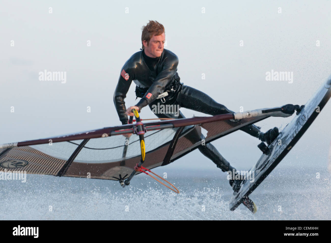 windsurfer in flight wind surf dynamic action sea spay fly Stock Photo ...