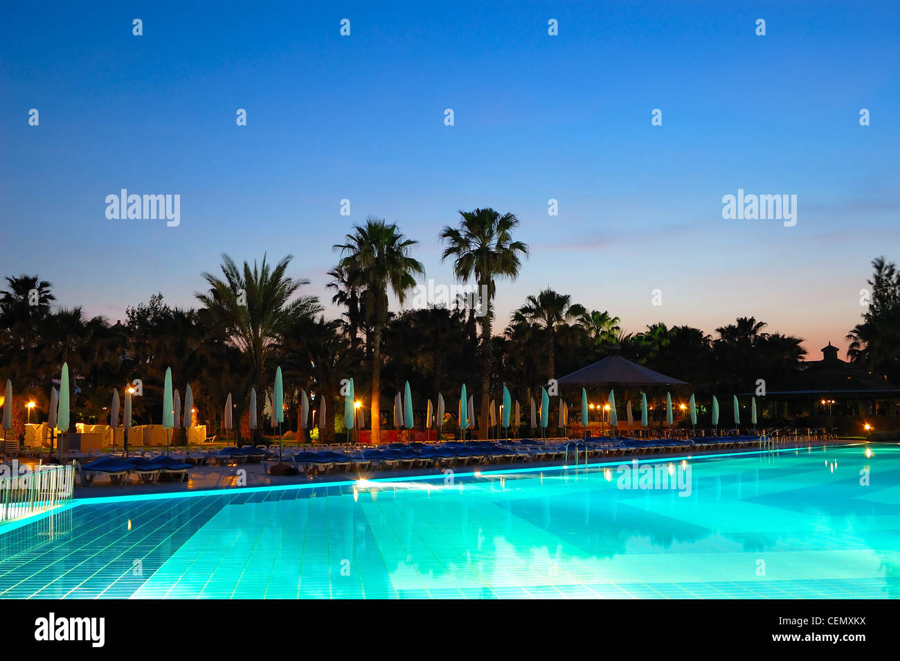 Sunset and swimming pool at popular hotel, Antalya, Turkey Stock Photo ...