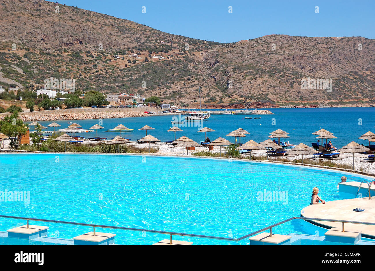 Swimming pool near beach at the modern luxury hotel, Crete, Greece ...