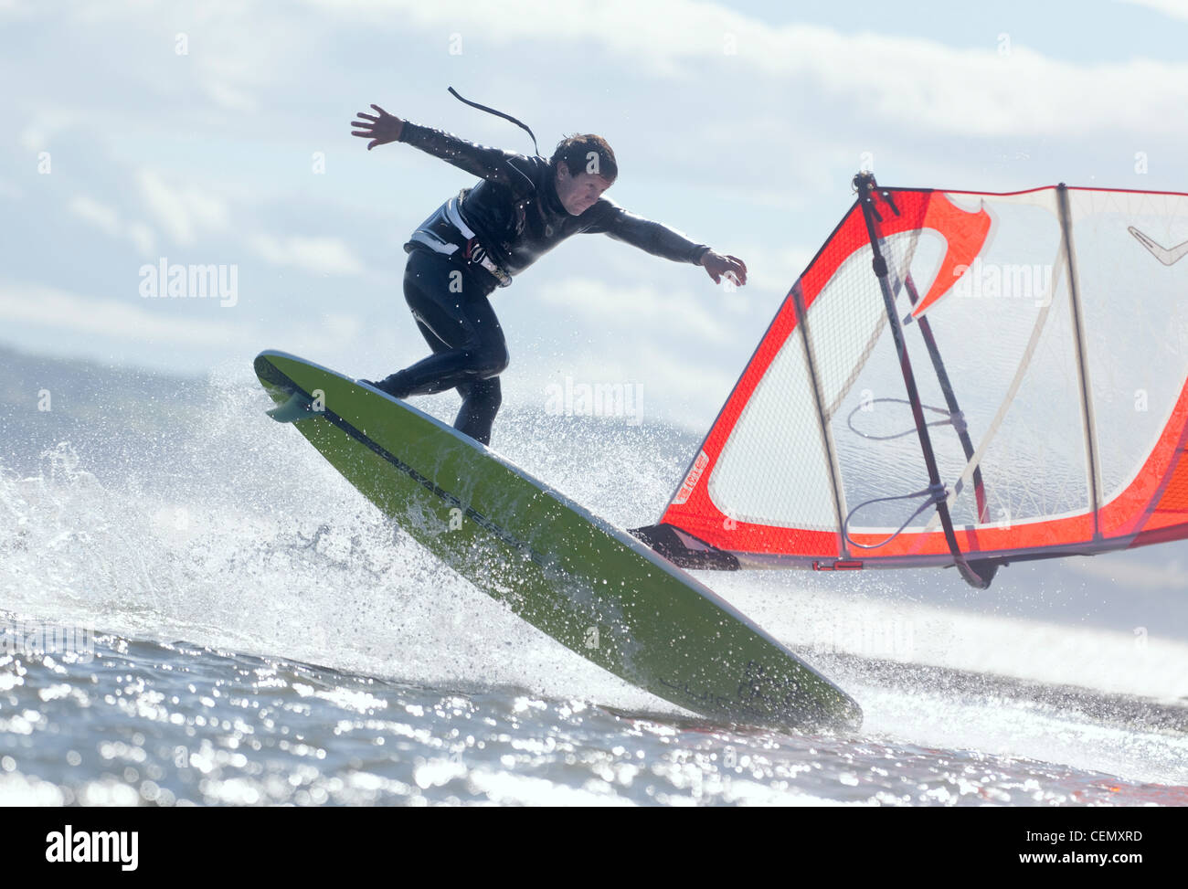 windsurfer falls into water sea ocean capsize Stock Photo - Alamy