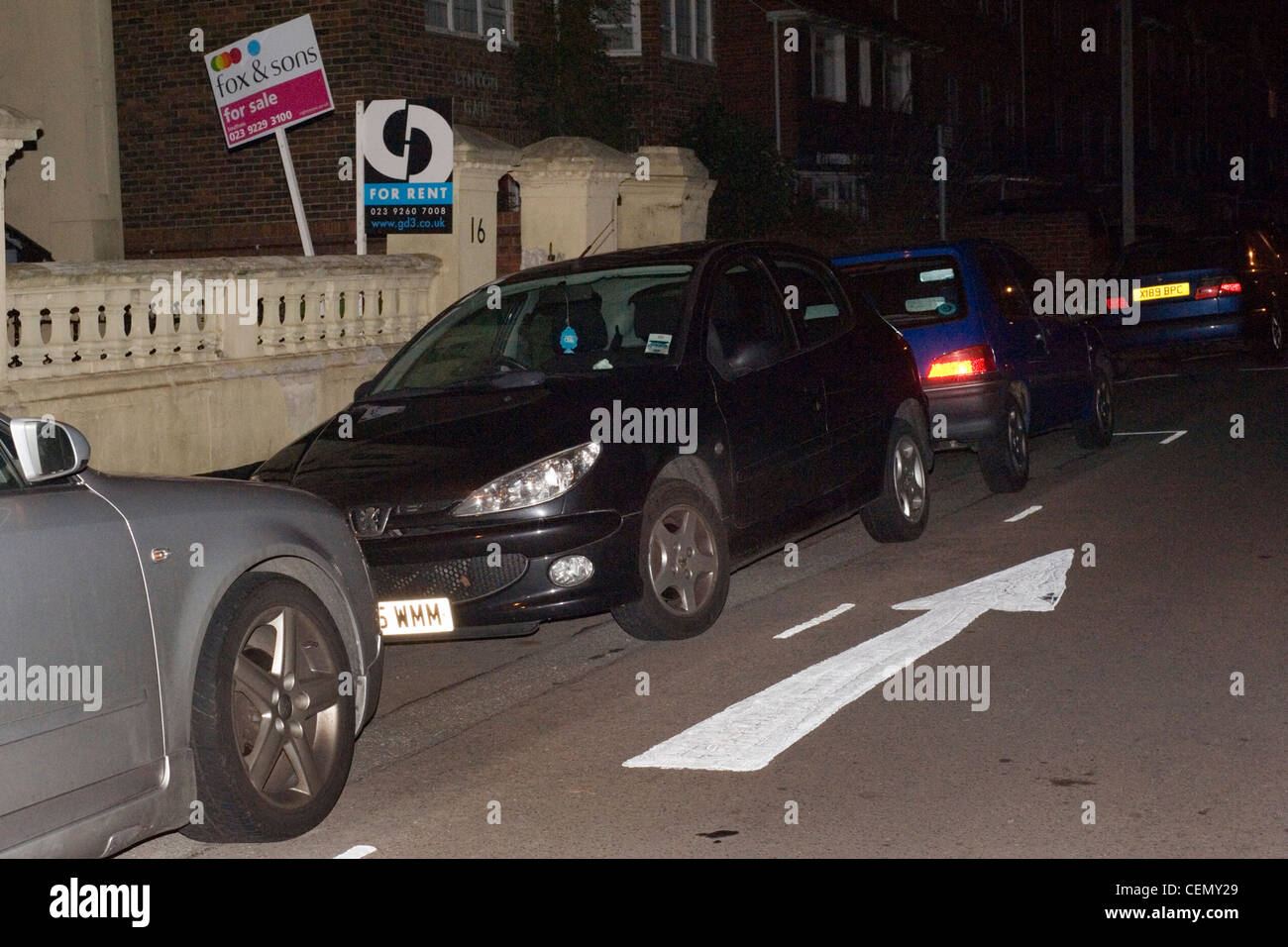 car driven and parked the wrong way in a one way street Stock Photo - Alamy