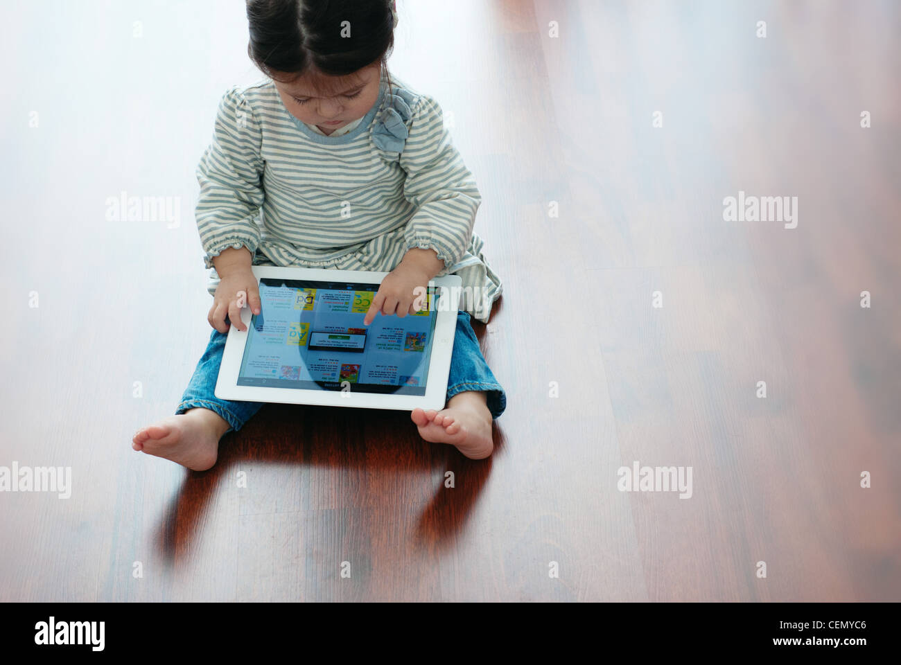 This is an image of a toddler learning ABC's on an iPad Stock Photo - Alamy